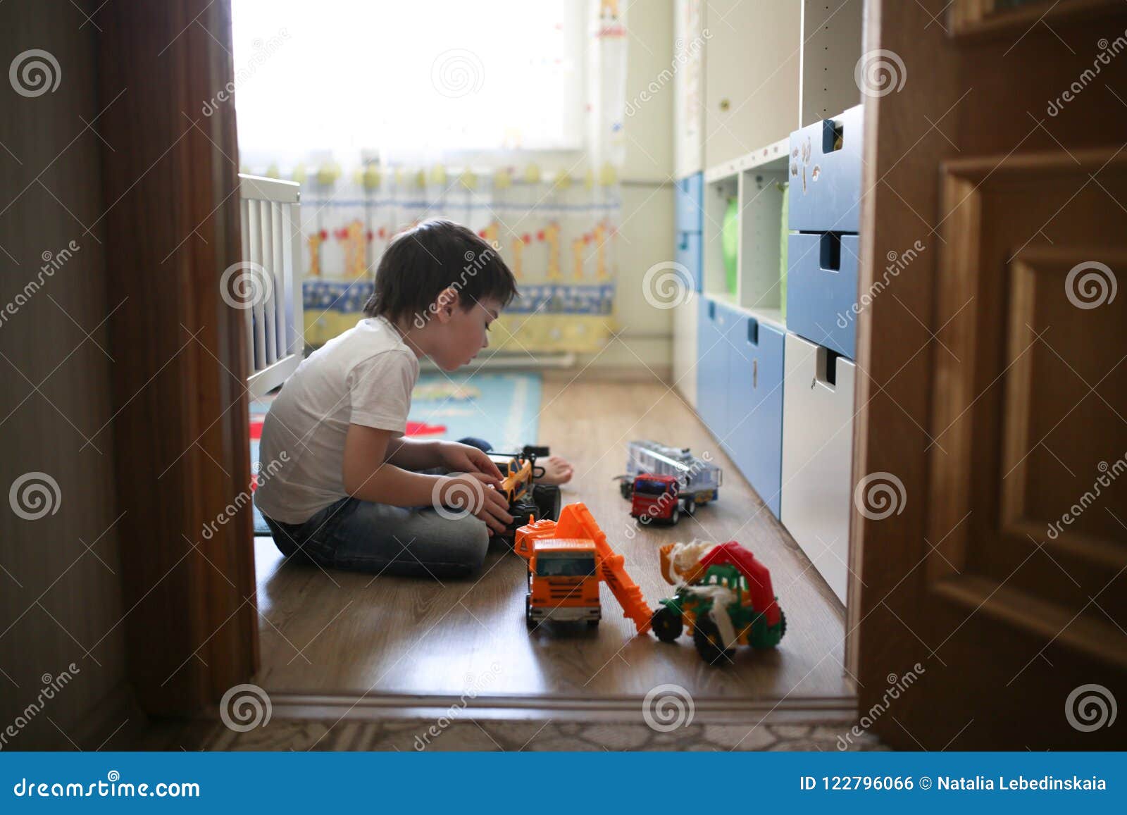 Boy Playing Alone in the Room, Loneliness Stock Photo - Image of door ...