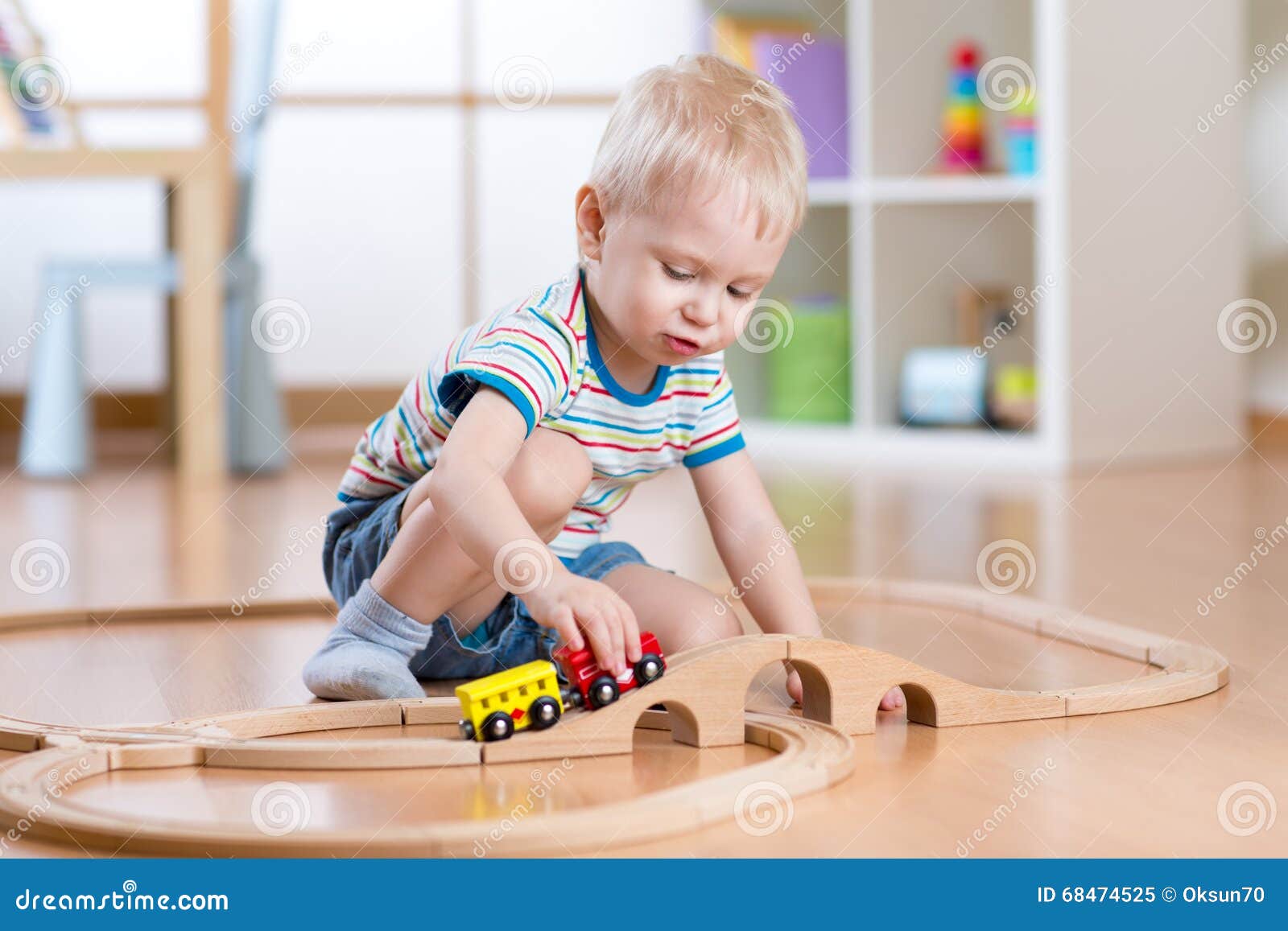 Child Boy Playing In His Room With A Toy Train Royalty-Free Stock ...