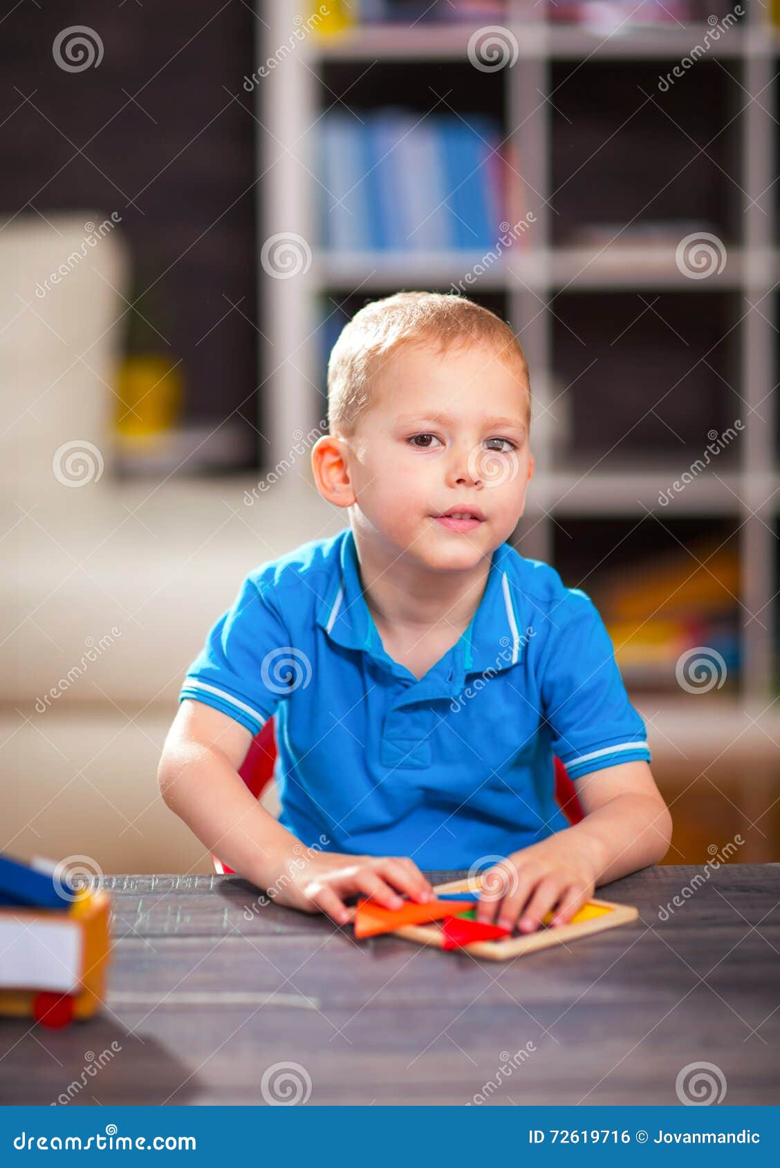 Child Boy Playing with Toys at Table Stock Photo - Image of play, chair ...