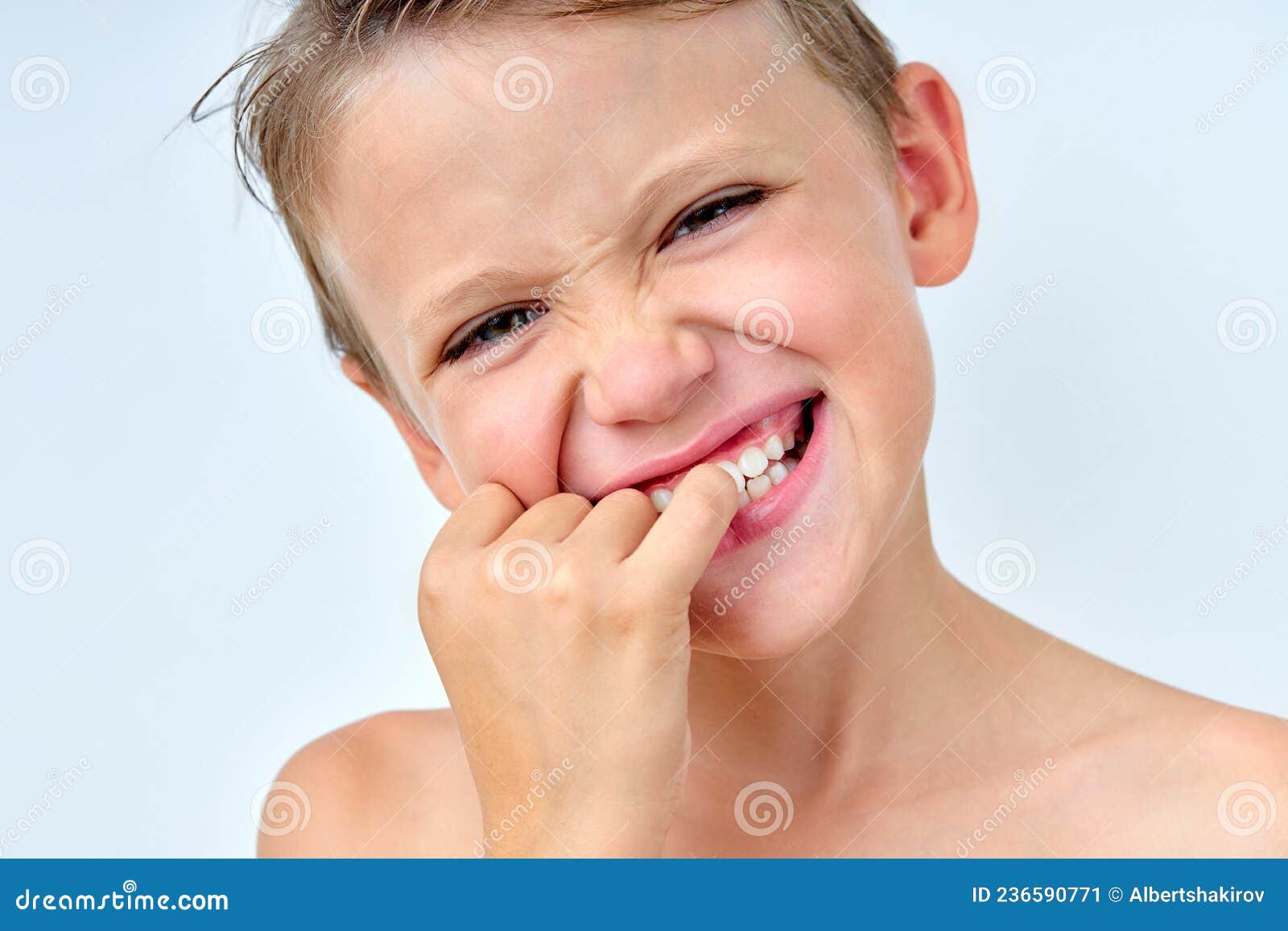 Child Boy Touching Teeth, Checking the Cleanliness, Looks Squinting ...