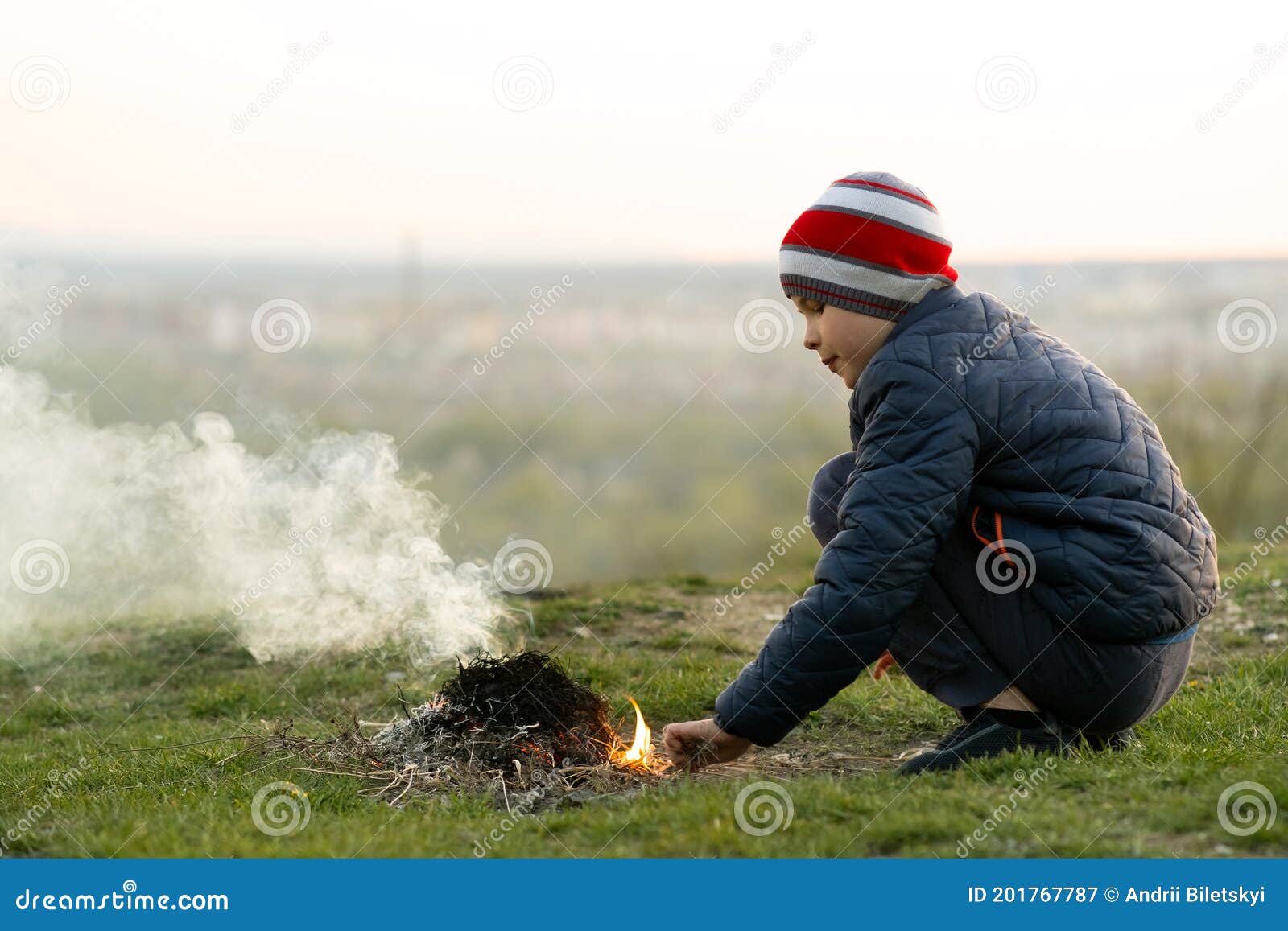 Child Boy Warming Near Bonfire Outdoors in Cold Weather Stock Image ...
