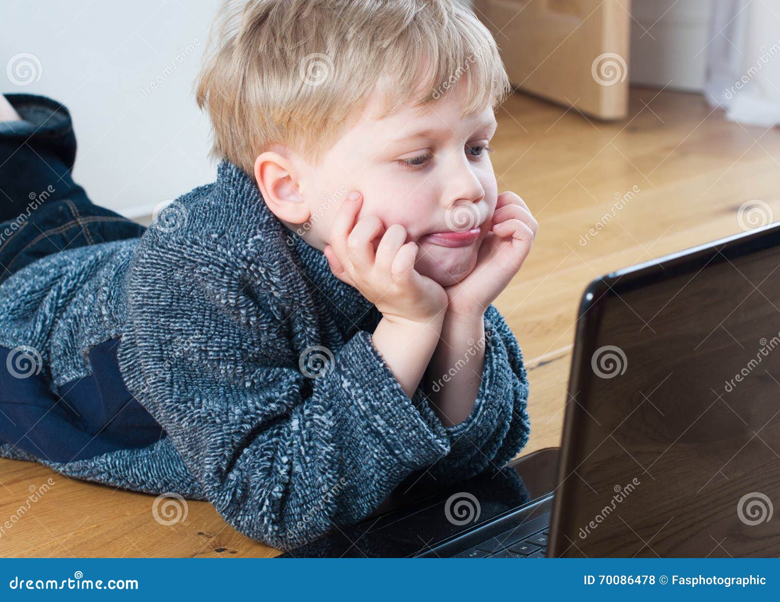 Child Browsing the Internet Stock Photo - Image of internet, look: 70086478