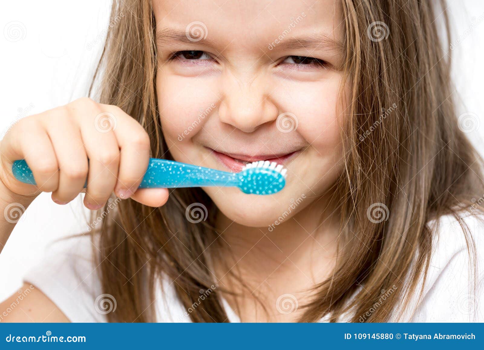 The Child Brushes Teeth, Toothpaste Stock Photo - Image of brushes ...