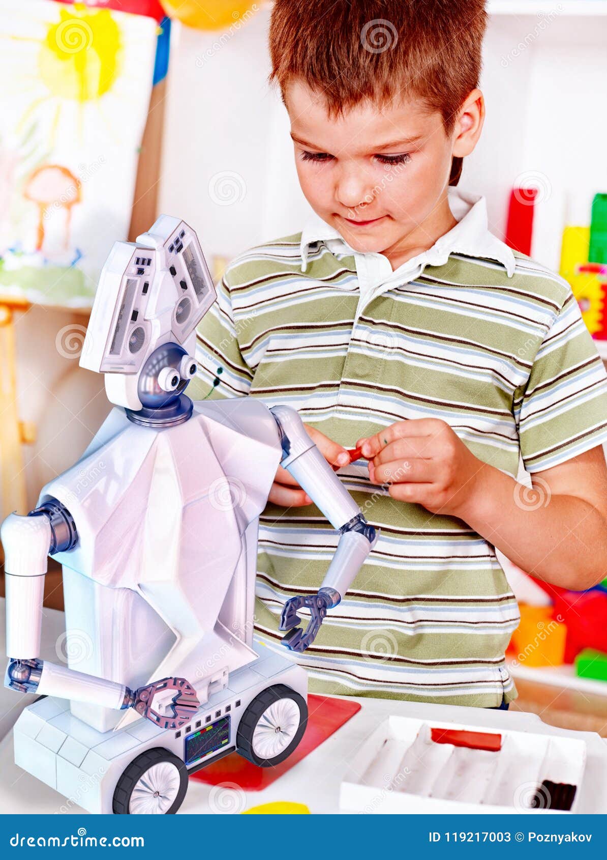 Child Build Robot Toy. Kid Engaged Robotics in Programming Classes ...