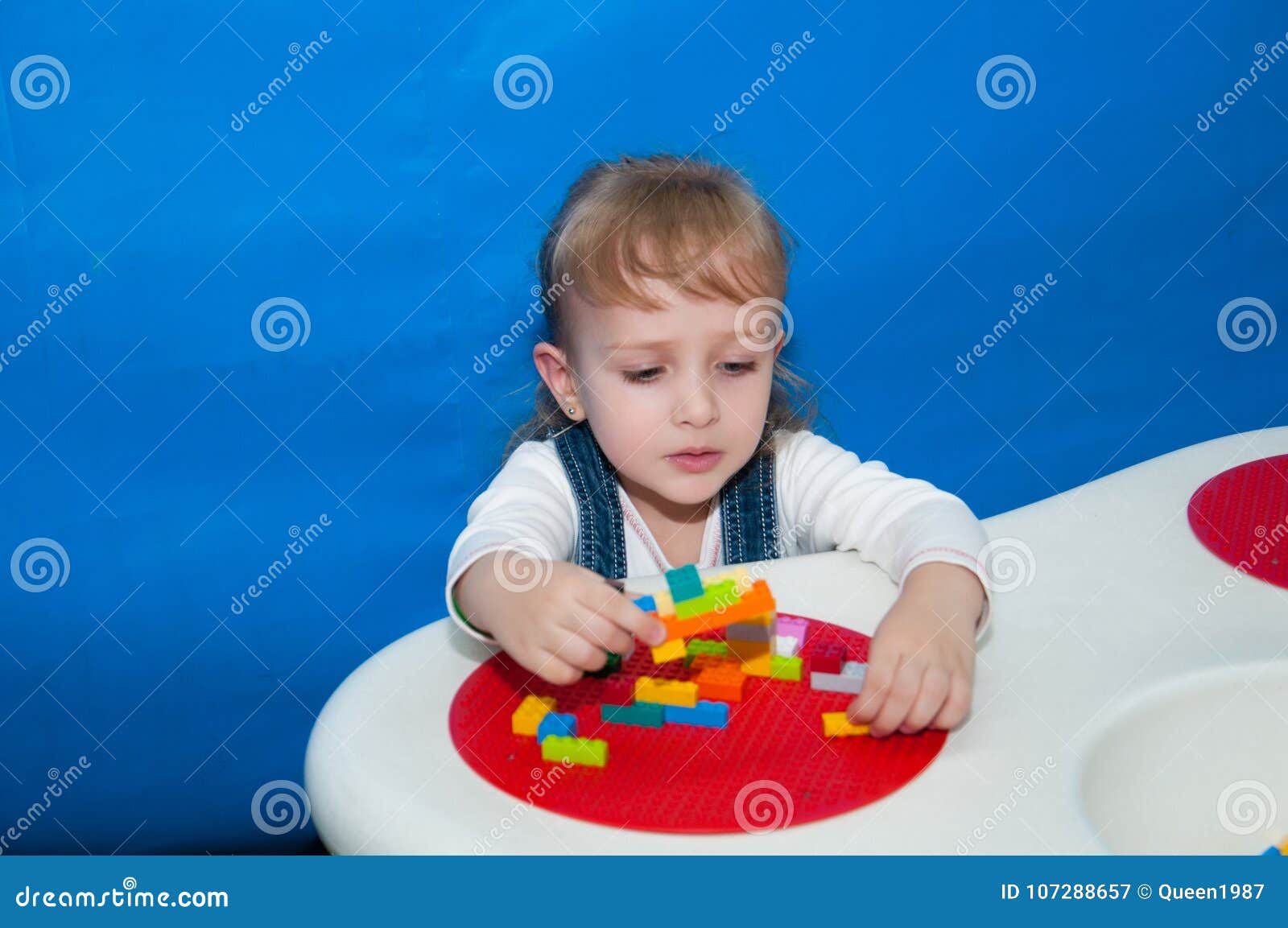 The Child is Building a Tower from the Constructor Stock Image - Image ...