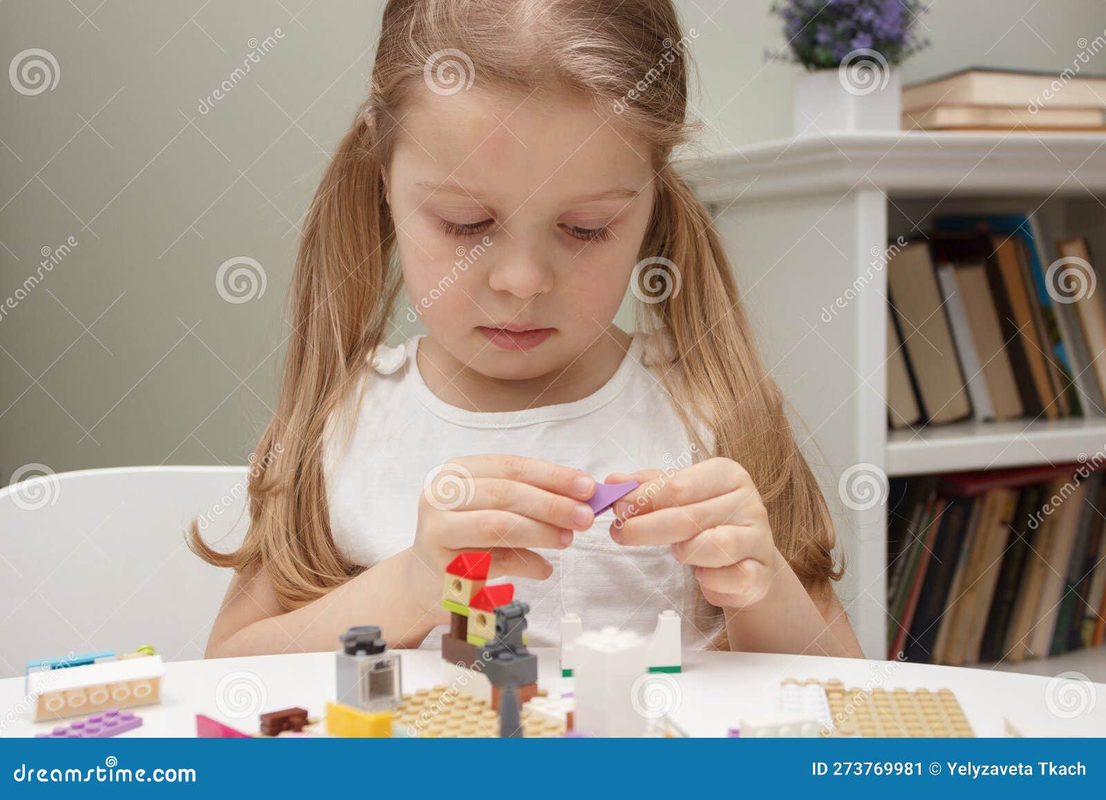 A Child Builds A Pyramid Of Cubes Stock Image | CartoonDealer.com ...