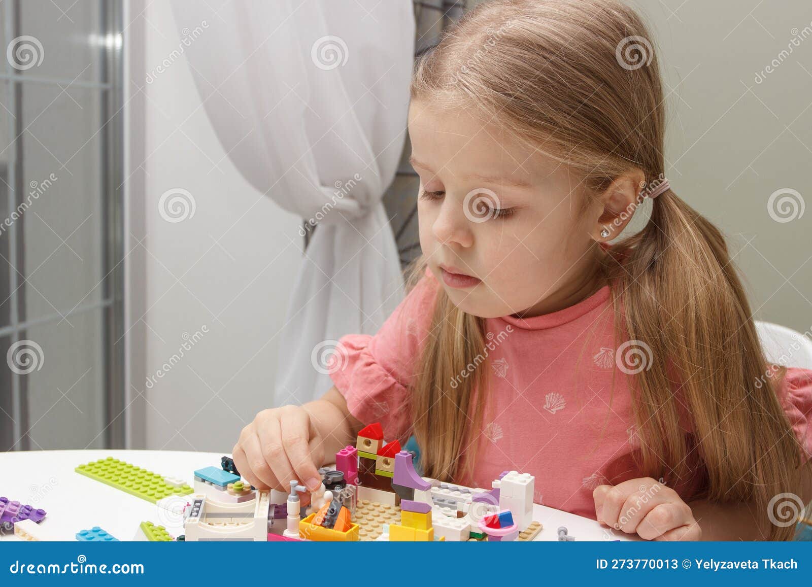 Child Builds with Constructor Bricks, Plays with Toys Stock Image ...