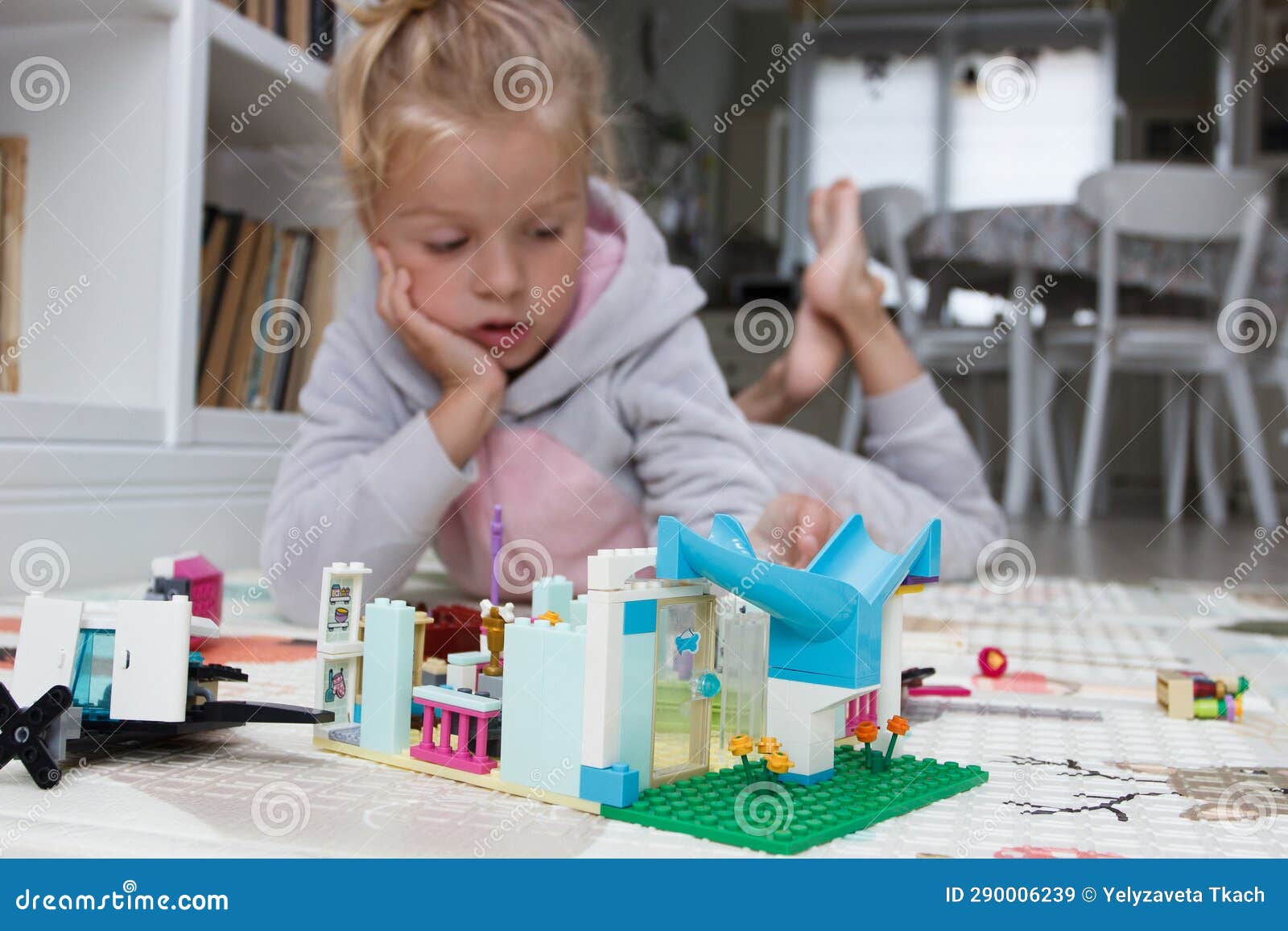 Child Builds with Constructor Bricks, Plays with Toys Stock Image ...