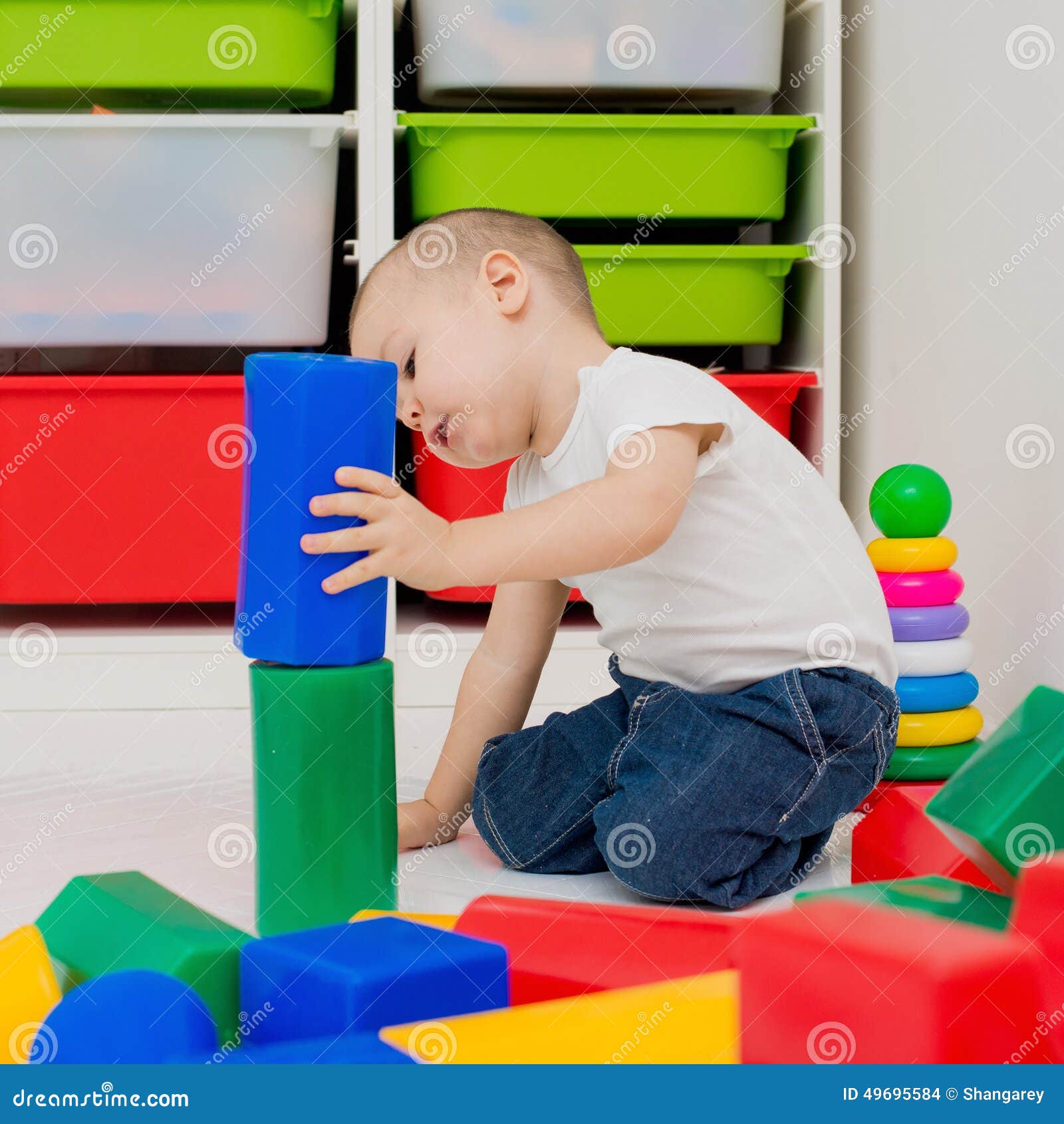 Child Builds a Tower of Cubes Stock Photo - Image of lifestyle, plastic ...