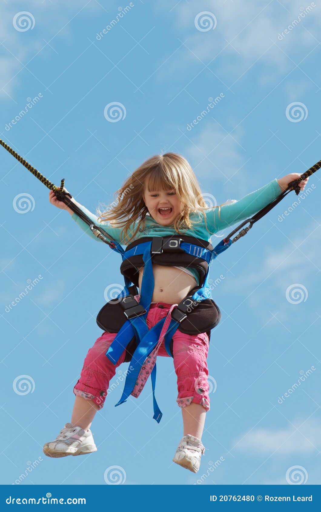 Child on bungee trampoline stock photo. Image of trampoline - 20762480