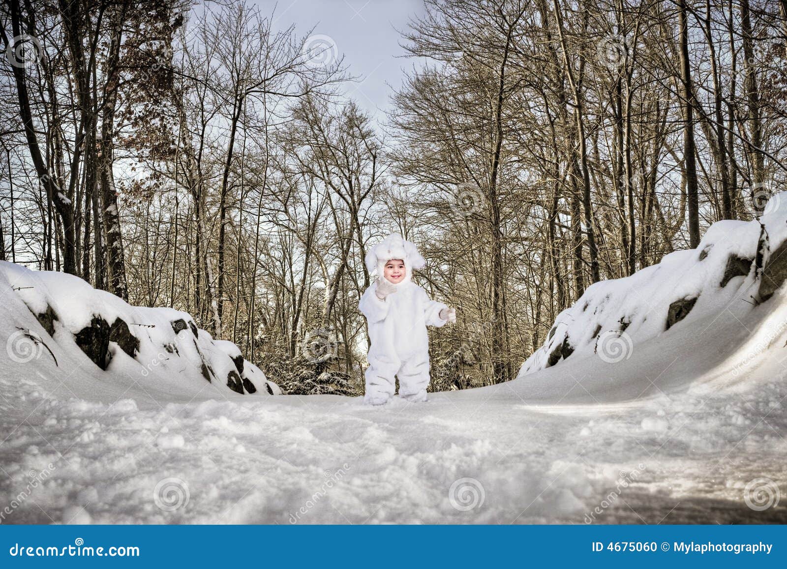 Child in Bunny Suit in Snow Stock Photo - Image of pines, rabbit: 4675060