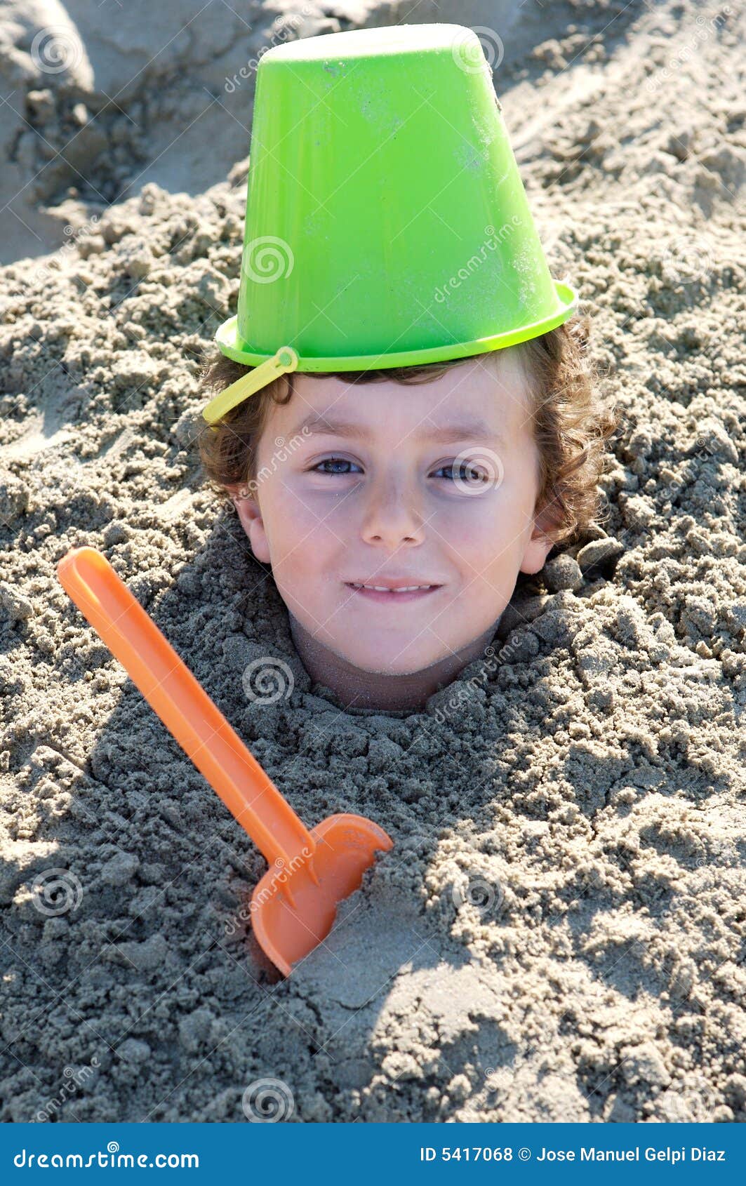 Child buried in the sand stock photo. Image of beach, caucasian - 5417068