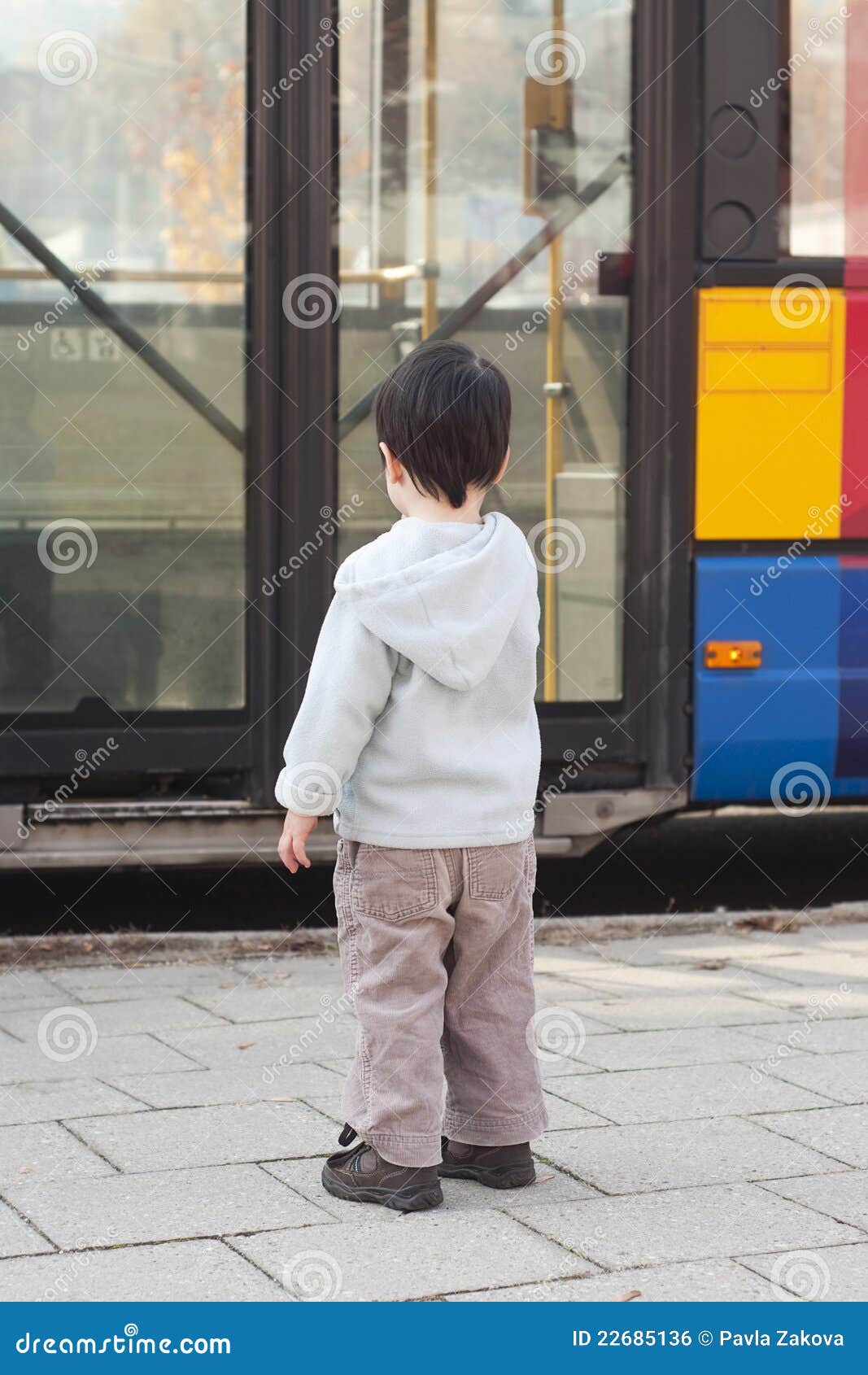Child at bus stop stock photo. Image of ride, waiting - 22685136