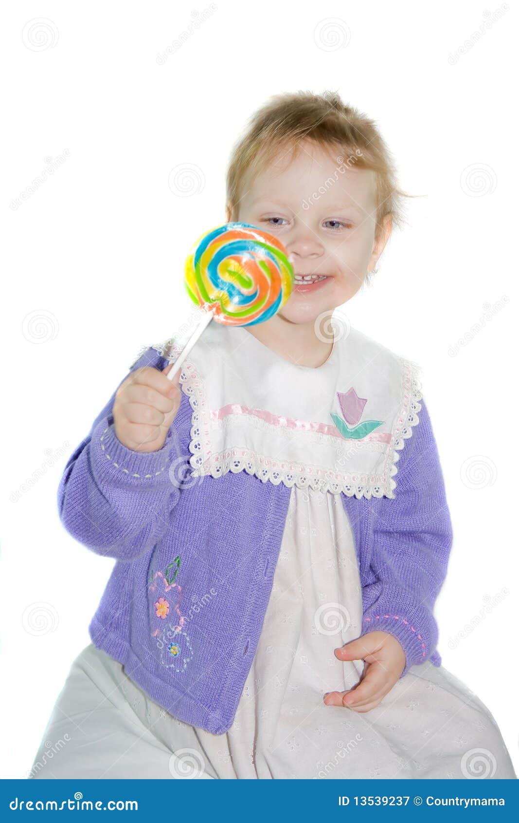 Child with candy. stock image. Image of grin, glad, holding - 13539237