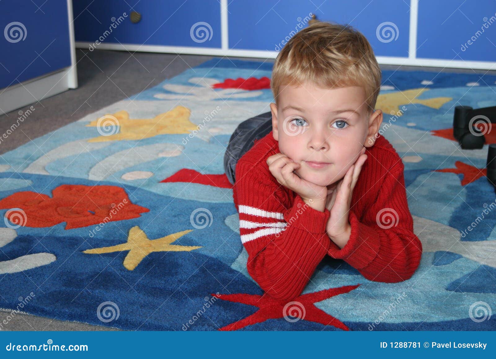 Child on carpet stock image. Image of life, eyes, toddler - 1288781