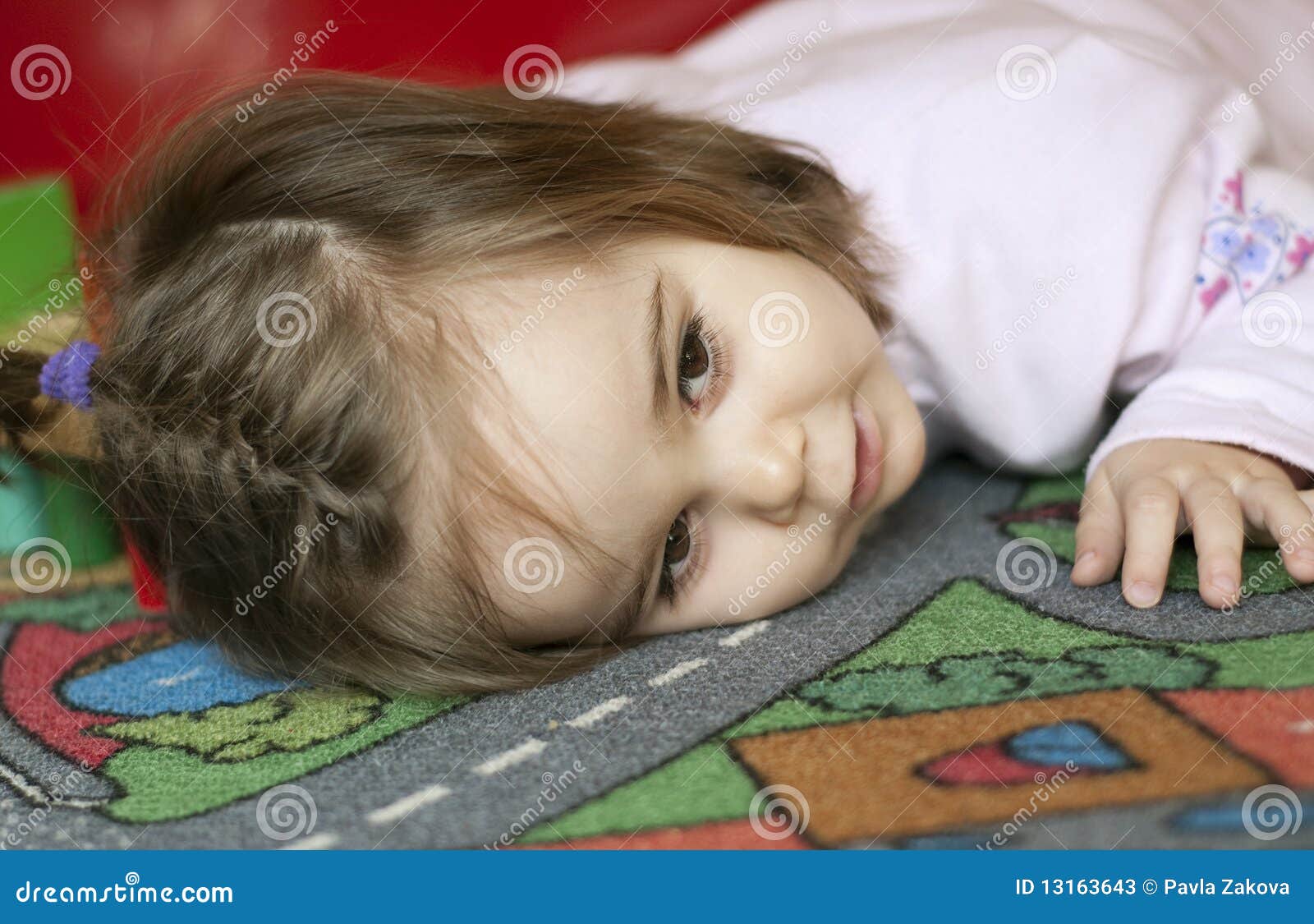 Child on carpet stock image. Image of little, area, face - 13163643