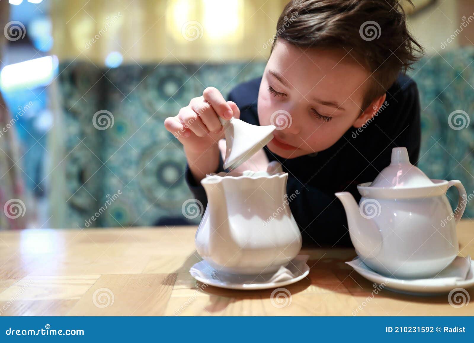 Child Checks Brewing of Tea Stock Photo - Image of lunch, making: 210231592