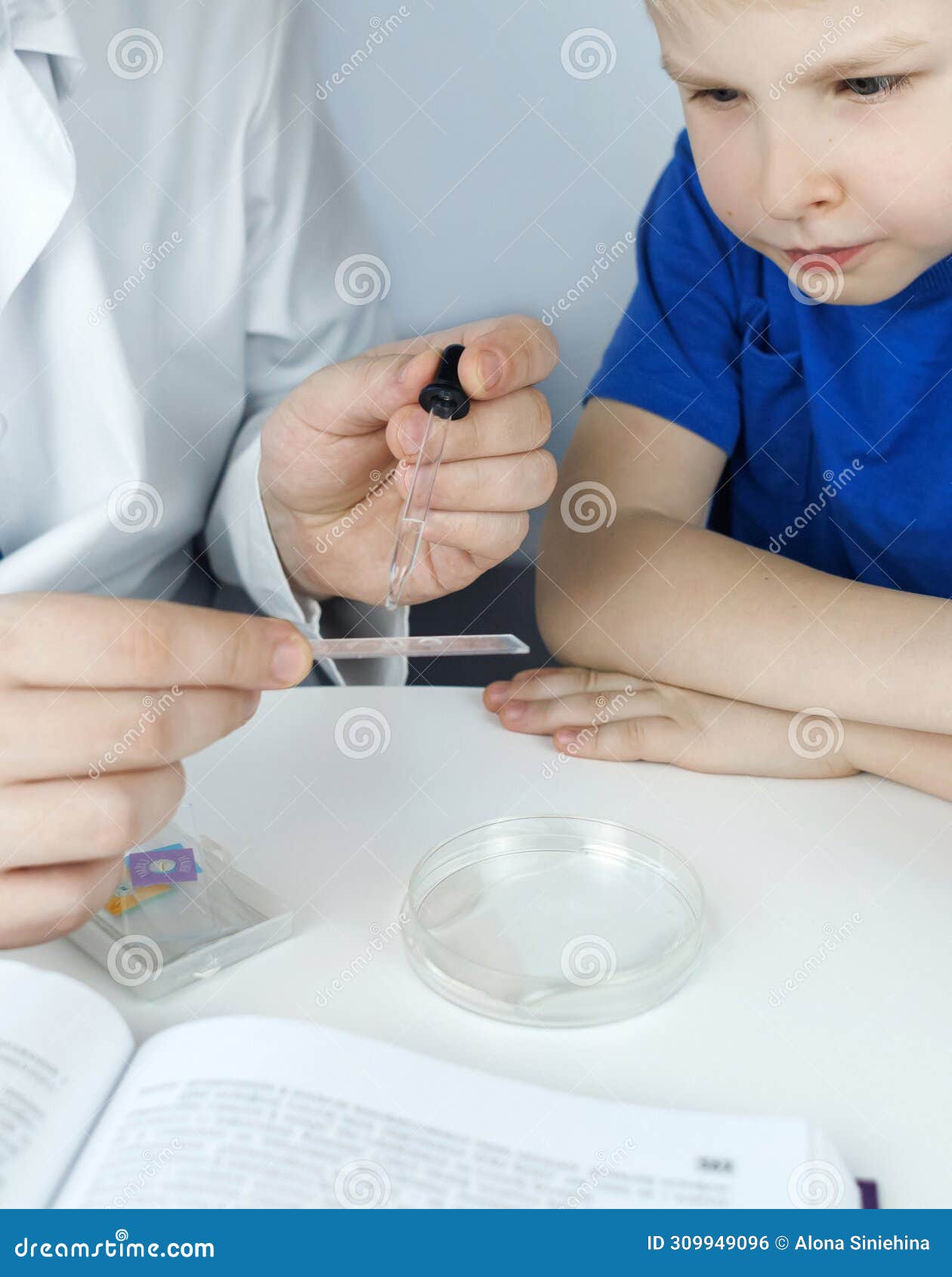 Child Chemist. Teacher Shows a Visual Experiment. a Science Mentor ...
