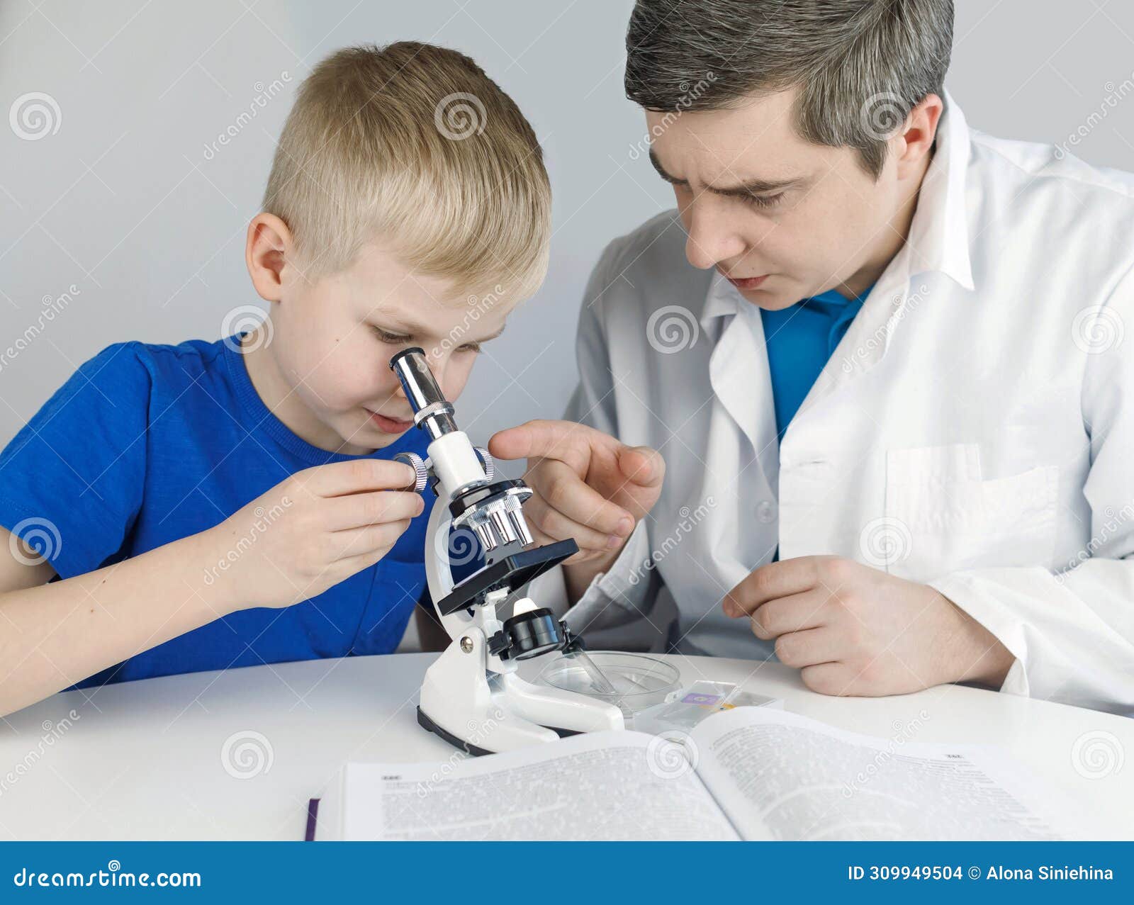 Child Chemist. Teacher Shows a Visual Experiment. a Science Mentor ...