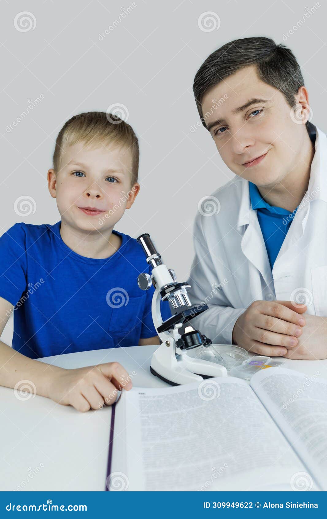 Child Chemist. Teacher Shows a Visual Experiment. a Science Mentor ...