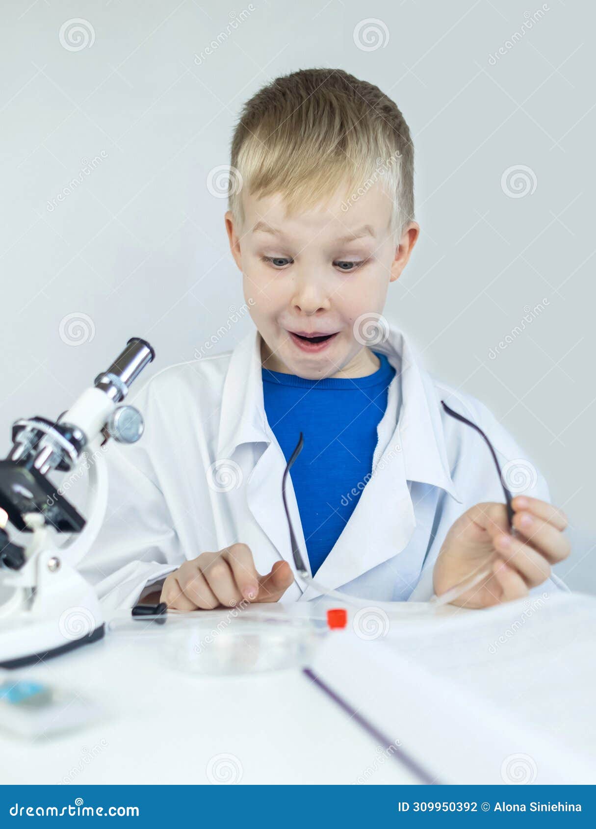 Child Chemist. Teacher Shows a Visual Experiment. a Science Mentor ...