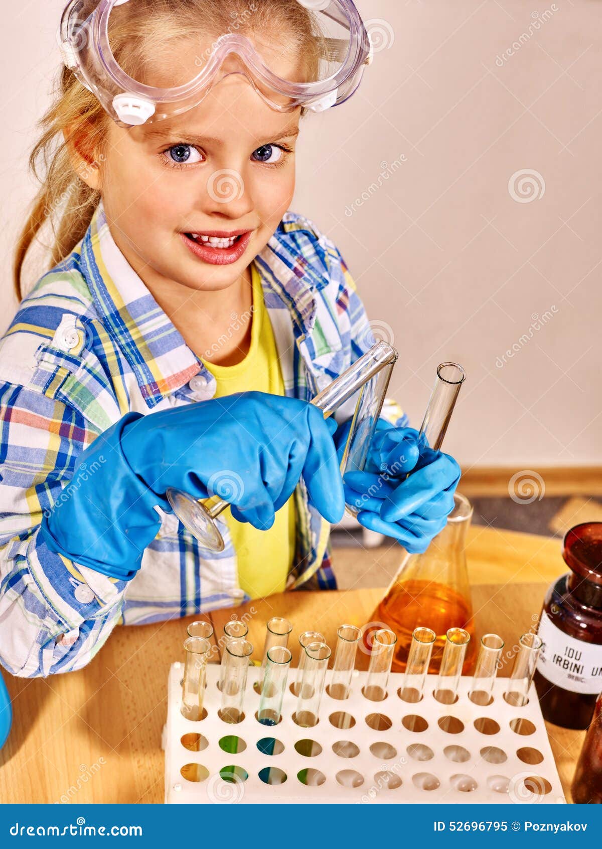 Child in chemistry class stock image. Image of education - 52696795