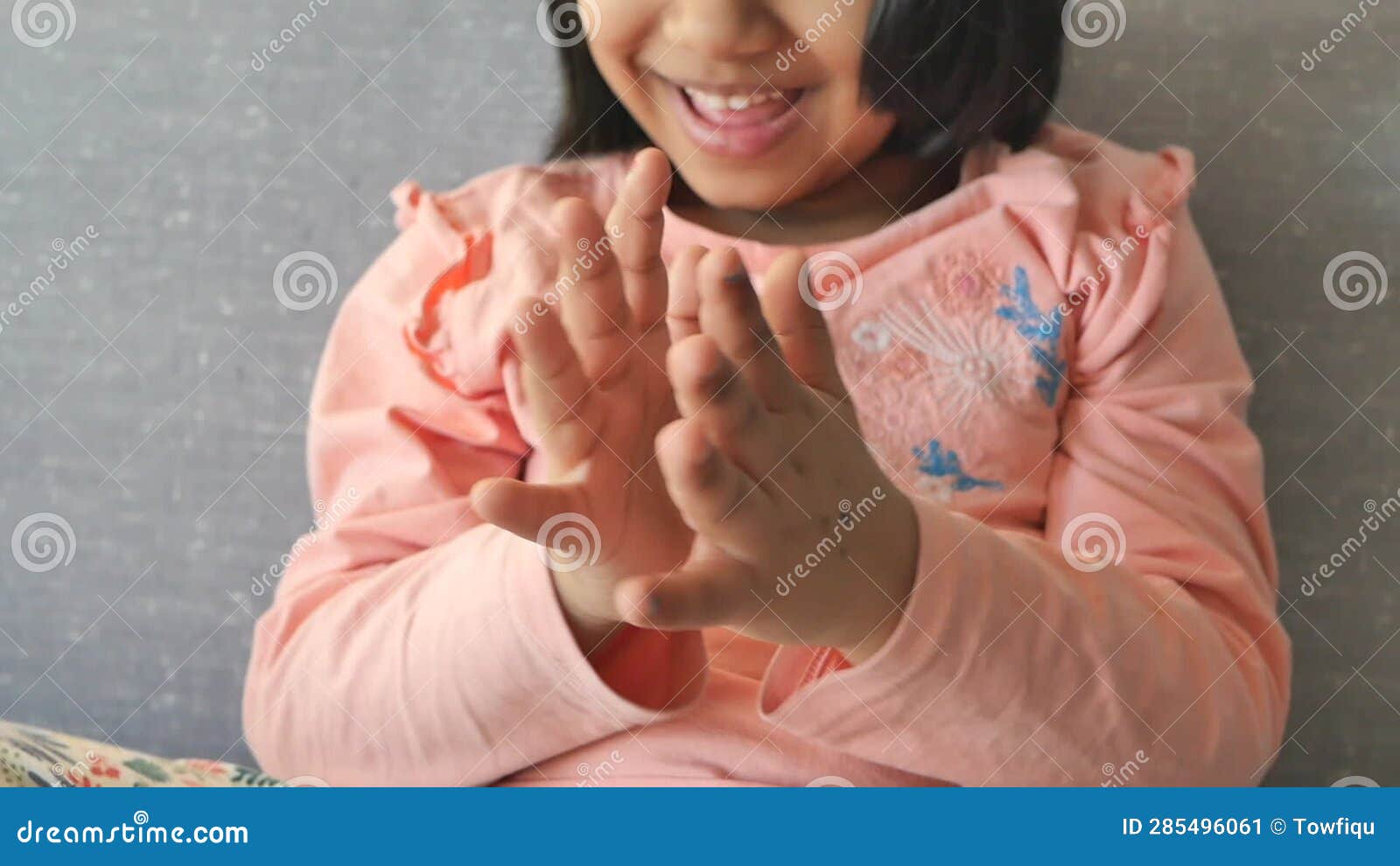 Child Clapping Hands and Smiling, Sitting on Sofa . Stock Video - Video ...