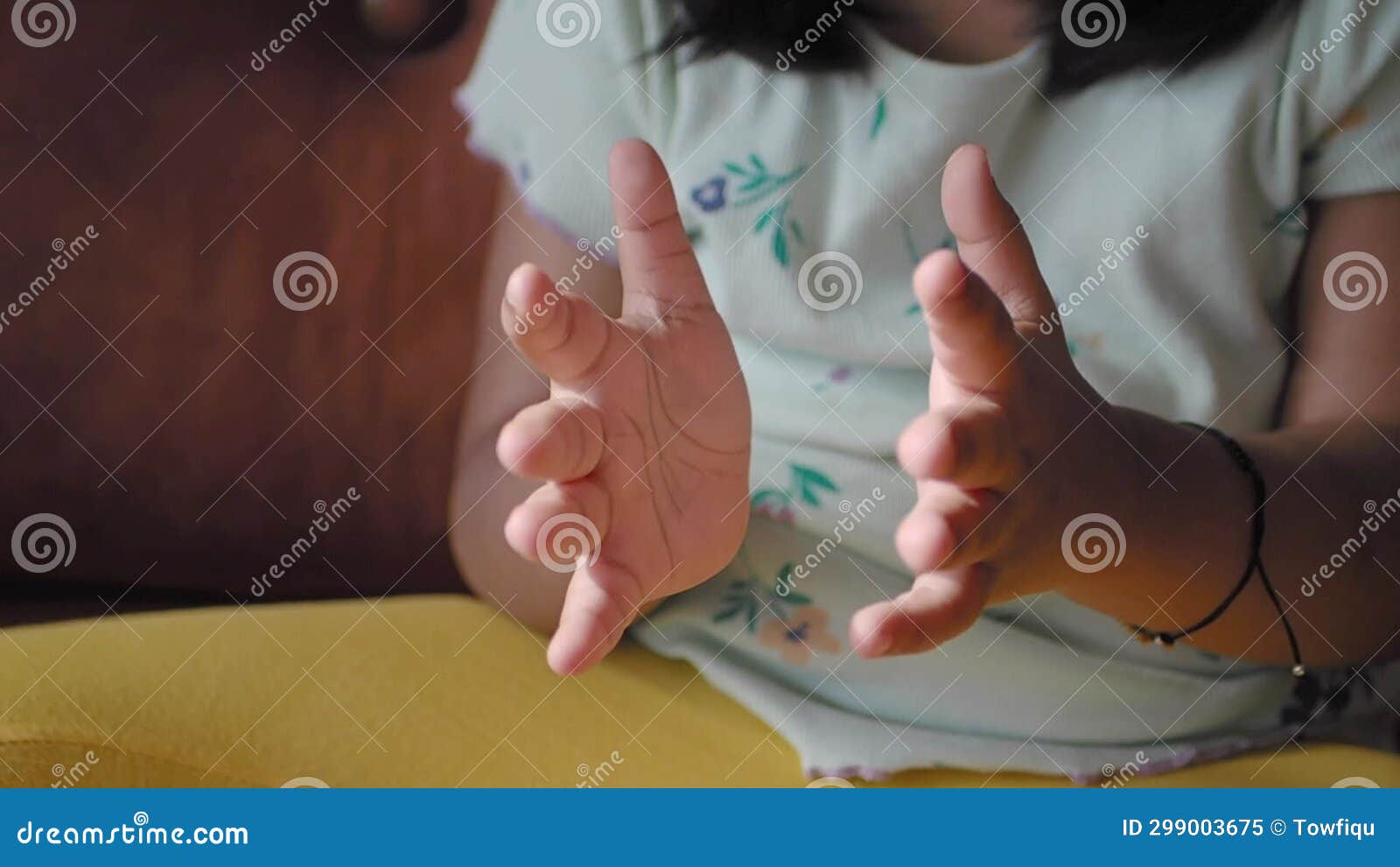 Child Clapping Hands and Smiling, Sitting on Sofa . Stock Video - Video ...
