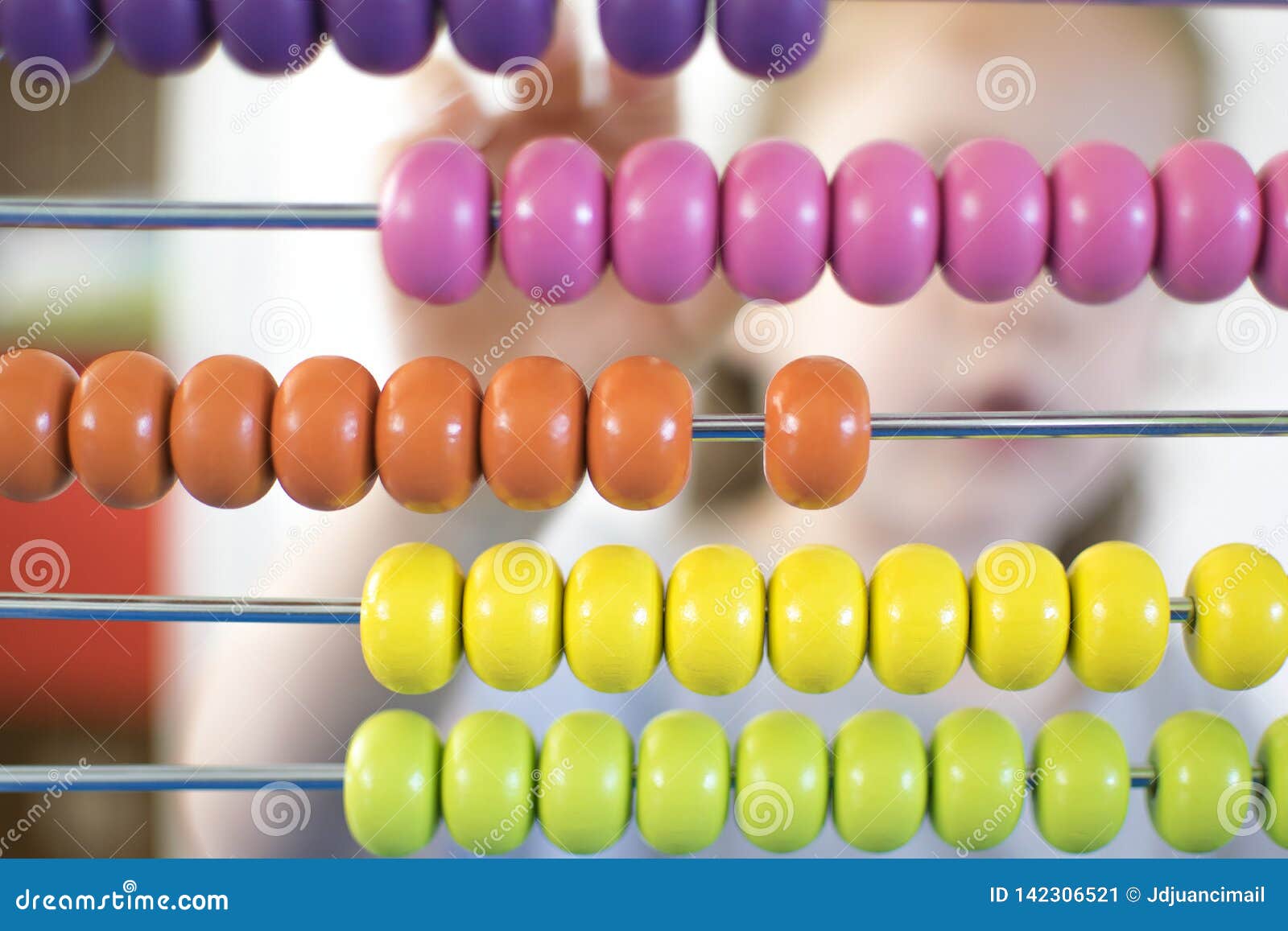 Child in a Classroom Learning Numbers and Menthal Calculation Playing ...