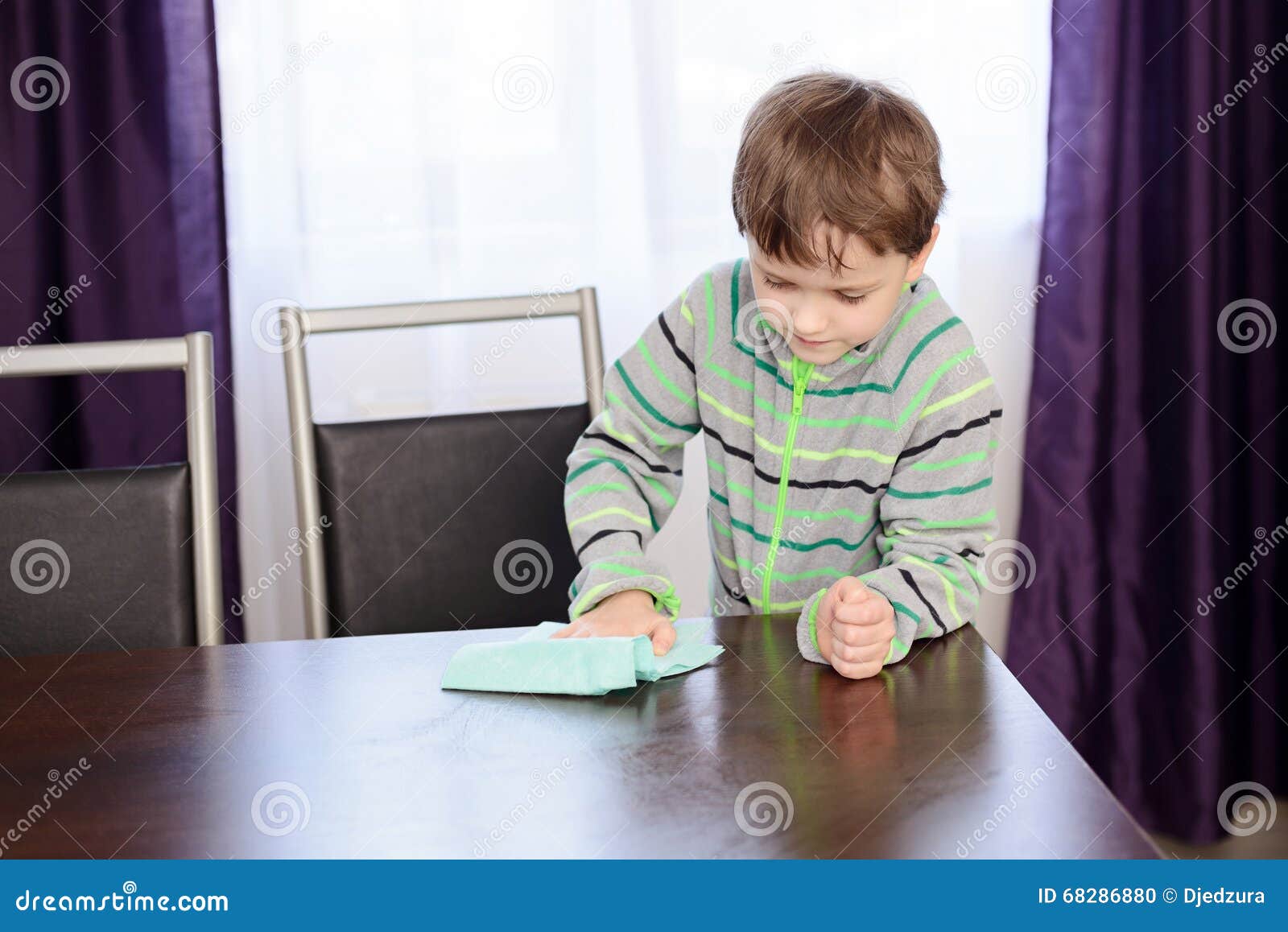 Child Cleaning Table in Kitchen with Rag. Stock Photo - Image of ...