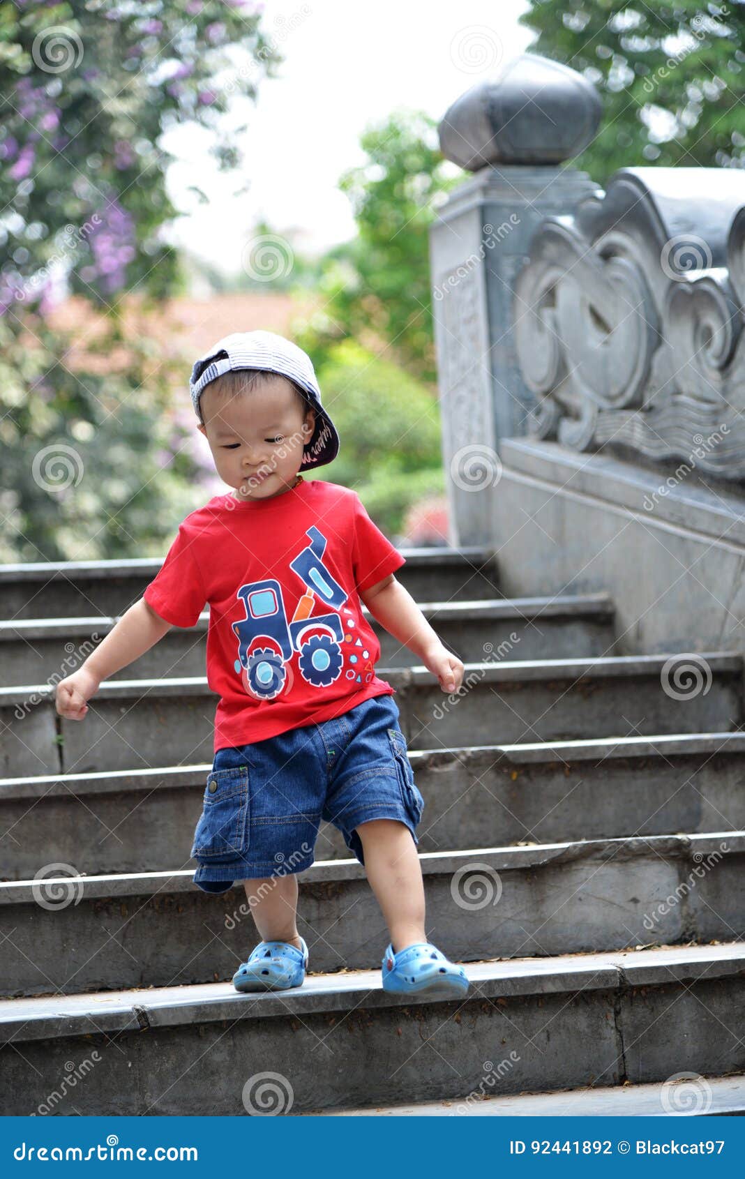 Child climb down stairs stock photo. Image of amused - 92441892