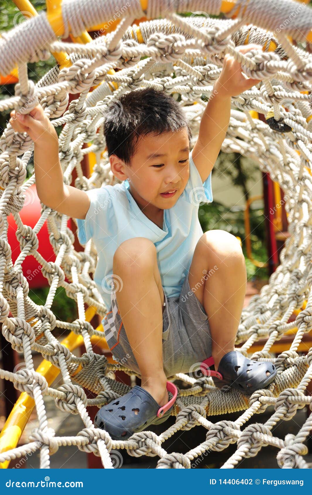 A Child Climbing a Jungle Gym. Stock Photo - Image of play, park: 14406402