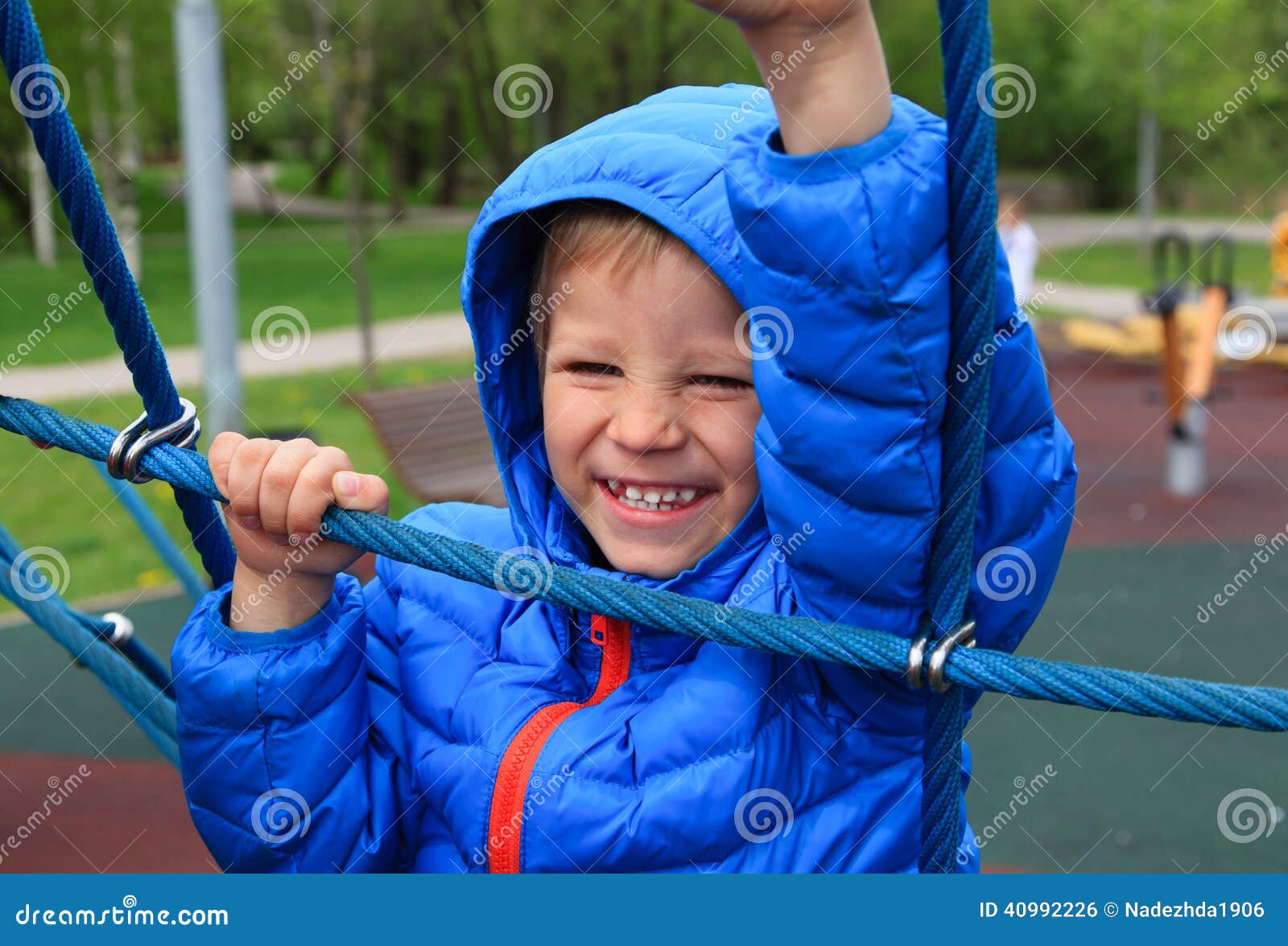 Child Climbing Rope on the Playground Stock Photo - Image of kids ...