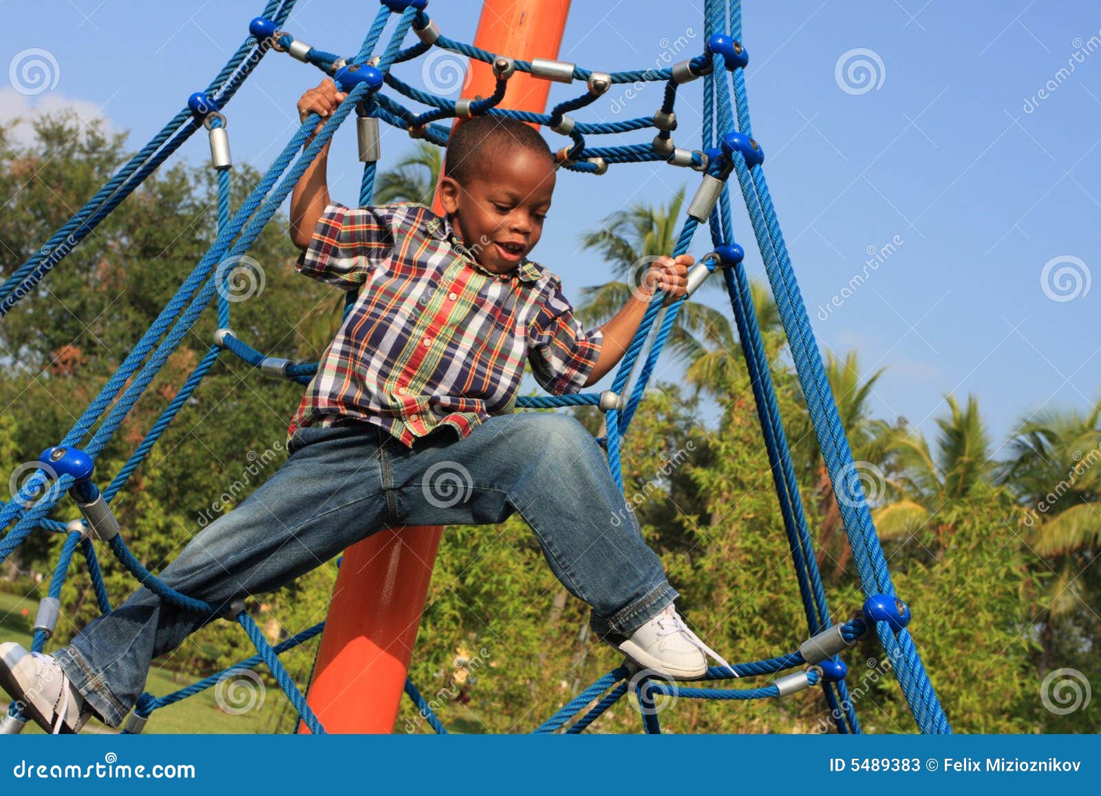 Child Climbing Ropes stock image. Image of outside, outdoors - 5489383