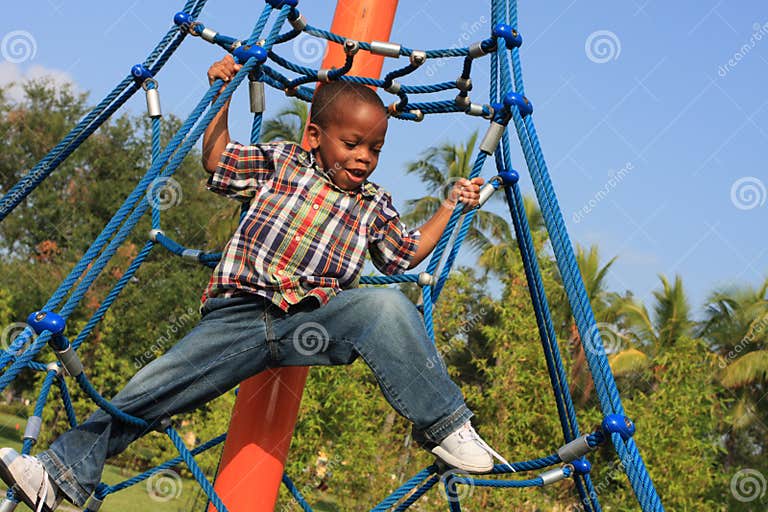 Child Climbing Ropes stock image. Image of outside, outdoors - 5489383