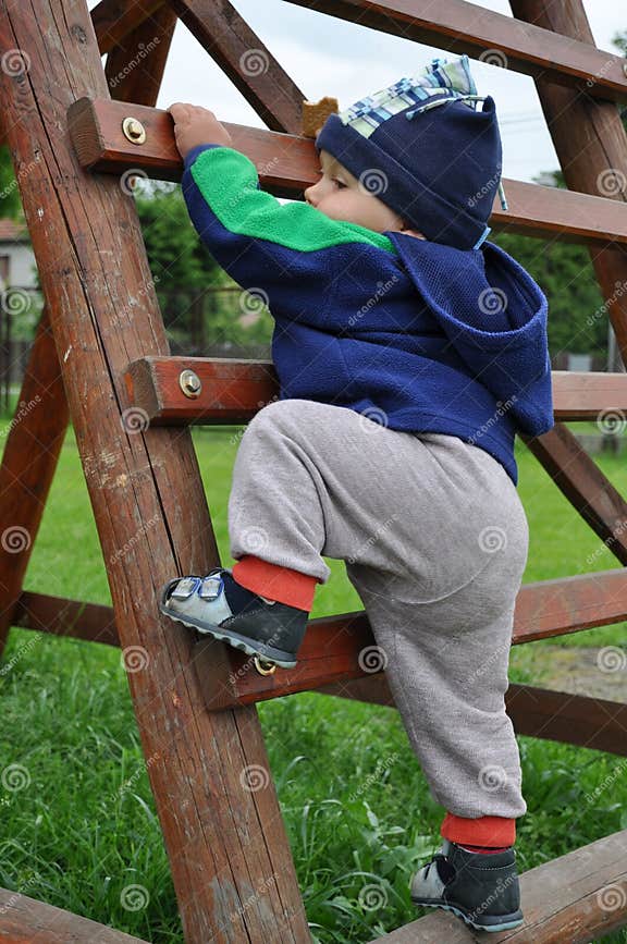 Child climbing step ladder stock photo. Image of ladder - 14550134