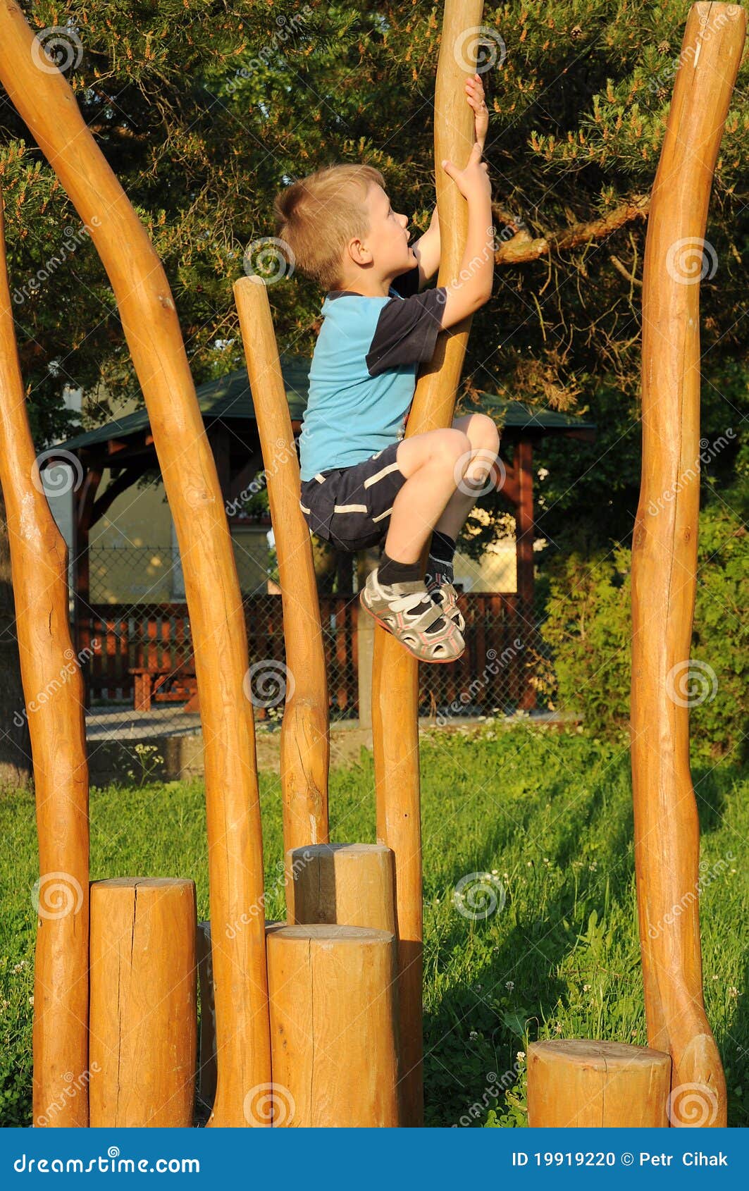 Child Climbing Wooden Column Stock Photo - Image of endeavour, effort ...