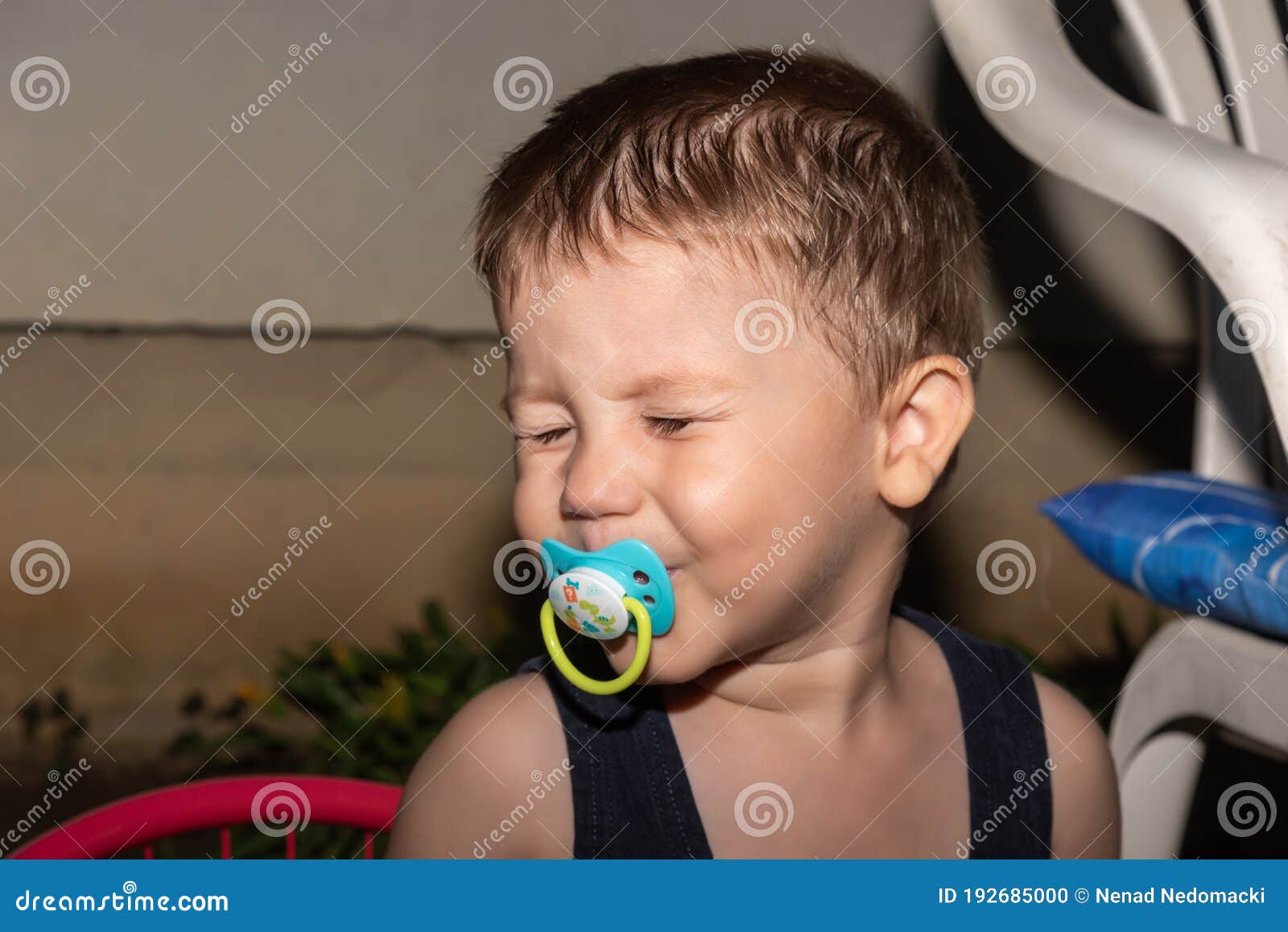 The Child Closed His Eyes with Pacifier Stock Photo - Image of holding ...
