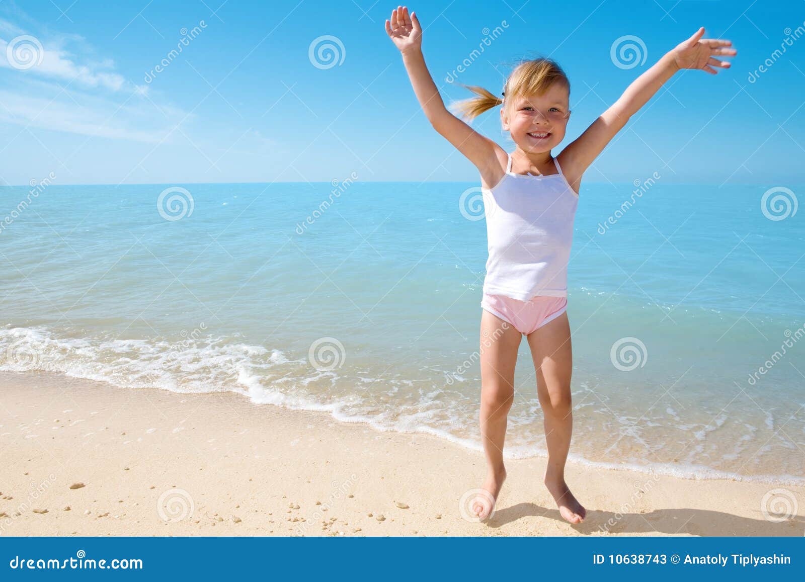 Child on coast of sea stock image. Image of splash, smile - 10638743