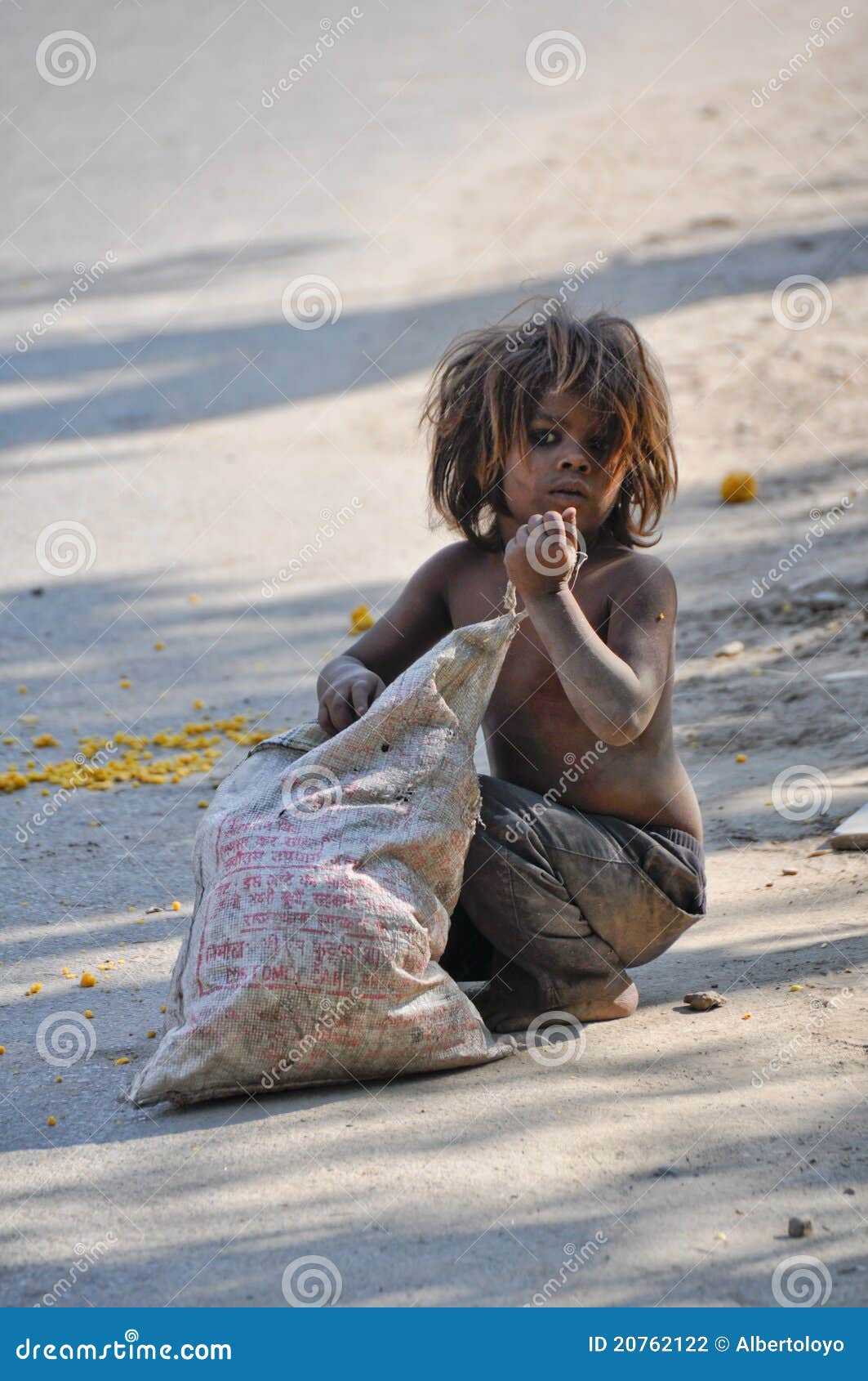 Child collecting garbage editorial photography. Image of street - 20762122