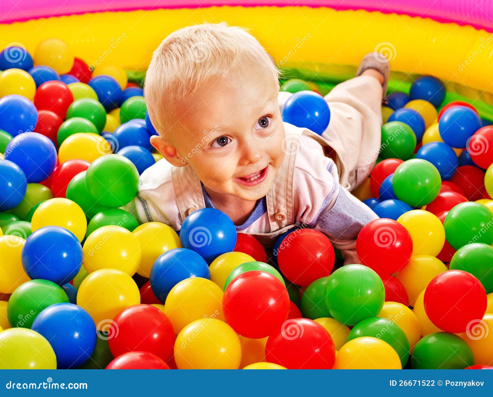 Child in colored ball. stock photo. Image of party, ball - 26671522