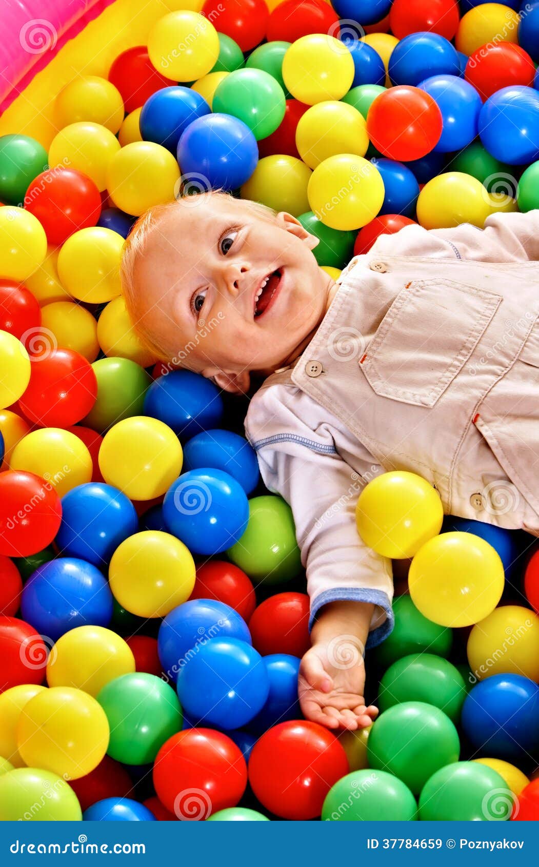 Child in colored ball. stock image. Image of colorful - 37784659