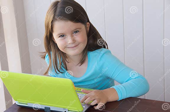 Child with computer stock image. Image of entertainment - 14003831