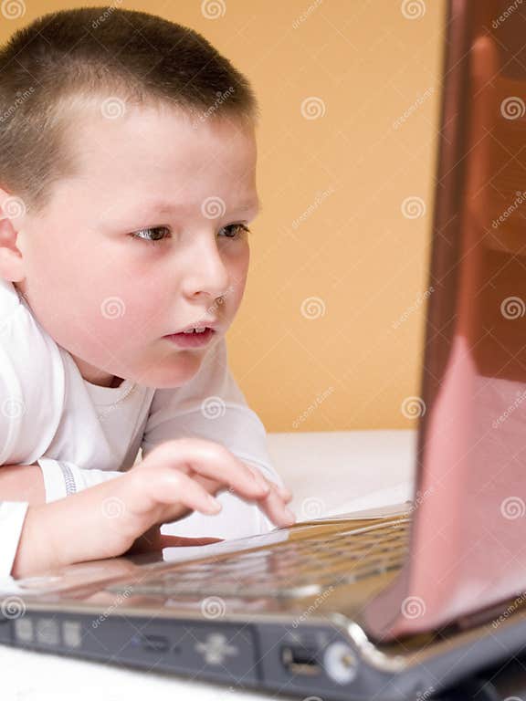 Child with computer stock photo. Image of study, game - 9824262
