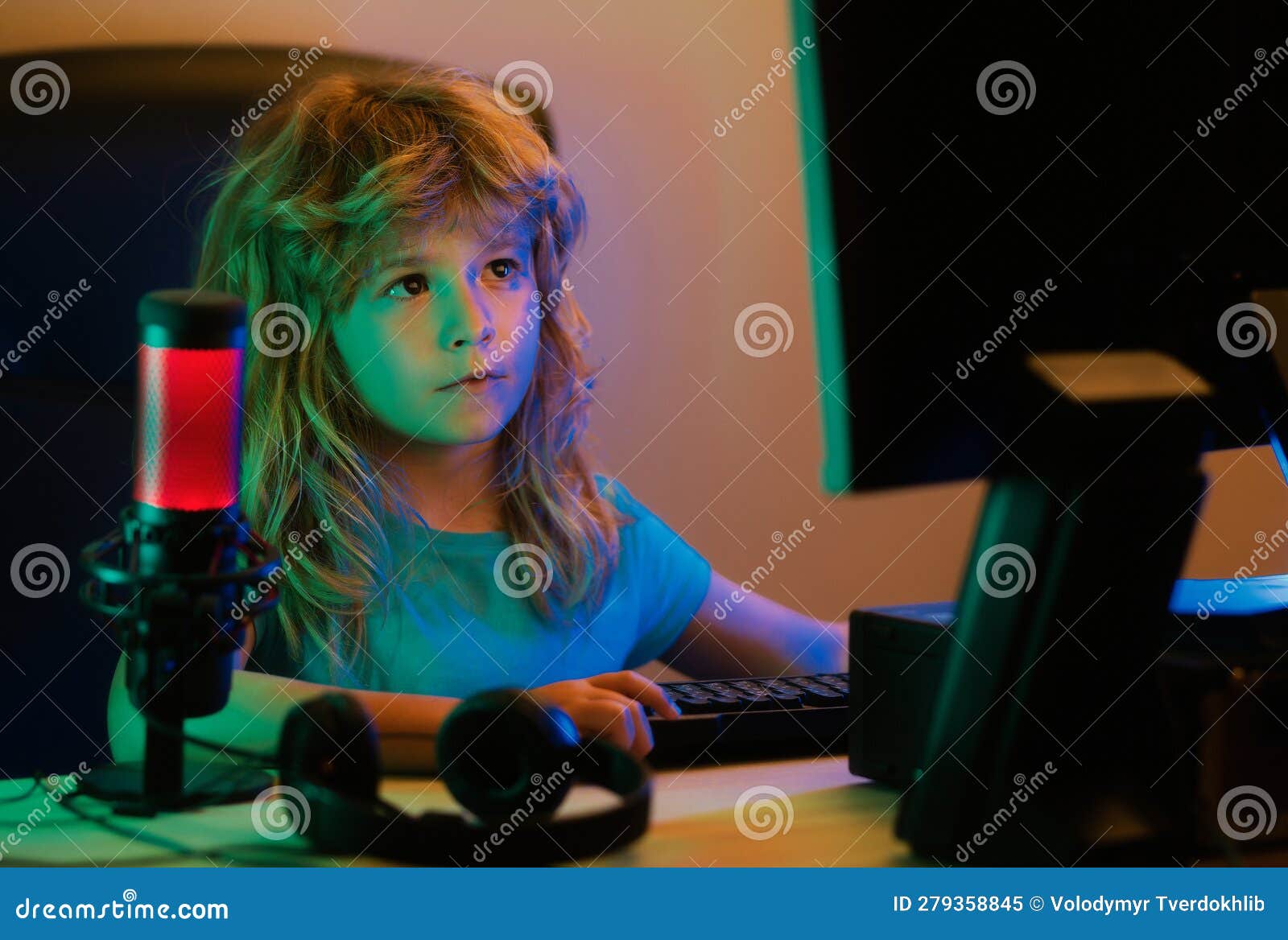 Child with Computer Late at Night. Neon Blue Light. Little Hacker ...