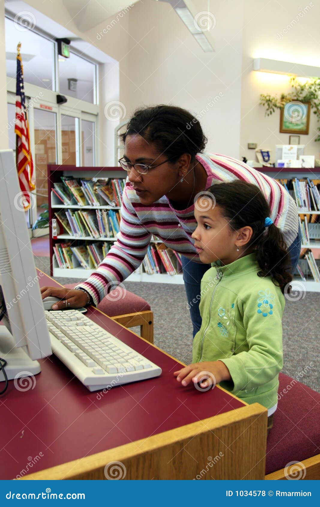 Child on Computer with Teacher Stock Photo - Image of female, novel ...