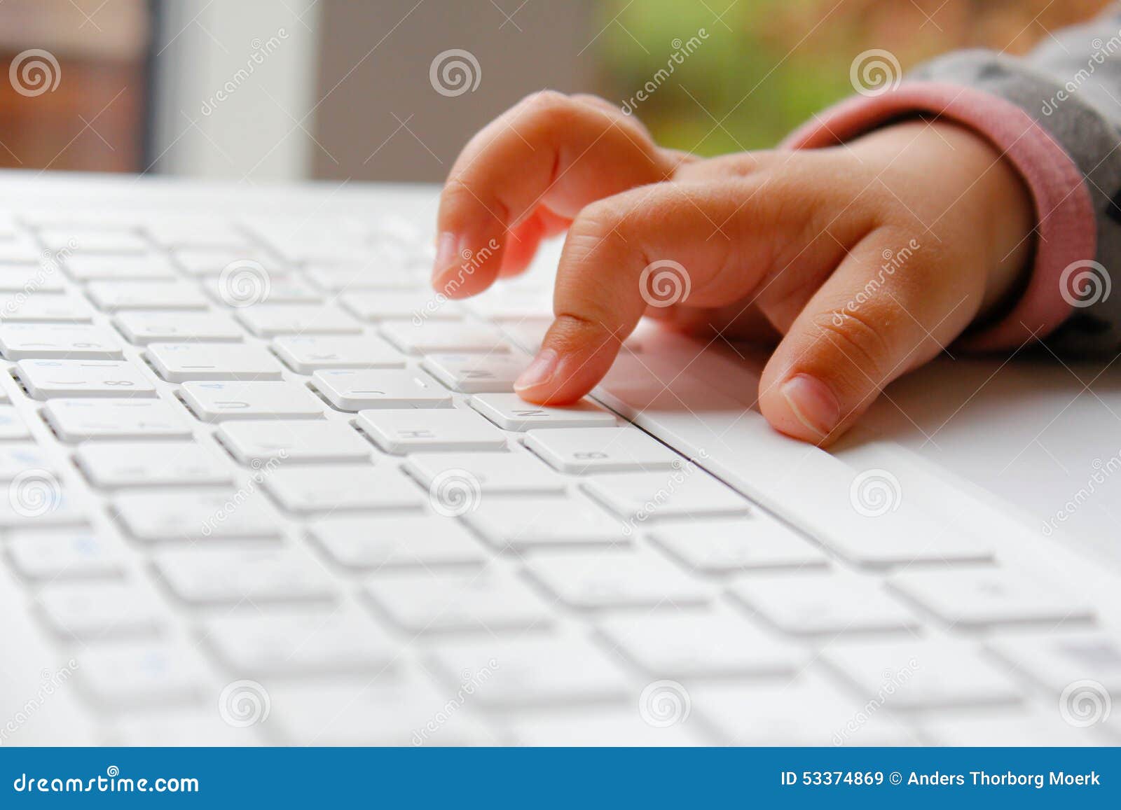 Child with a computer stock image. Image of wireless - 53374869
