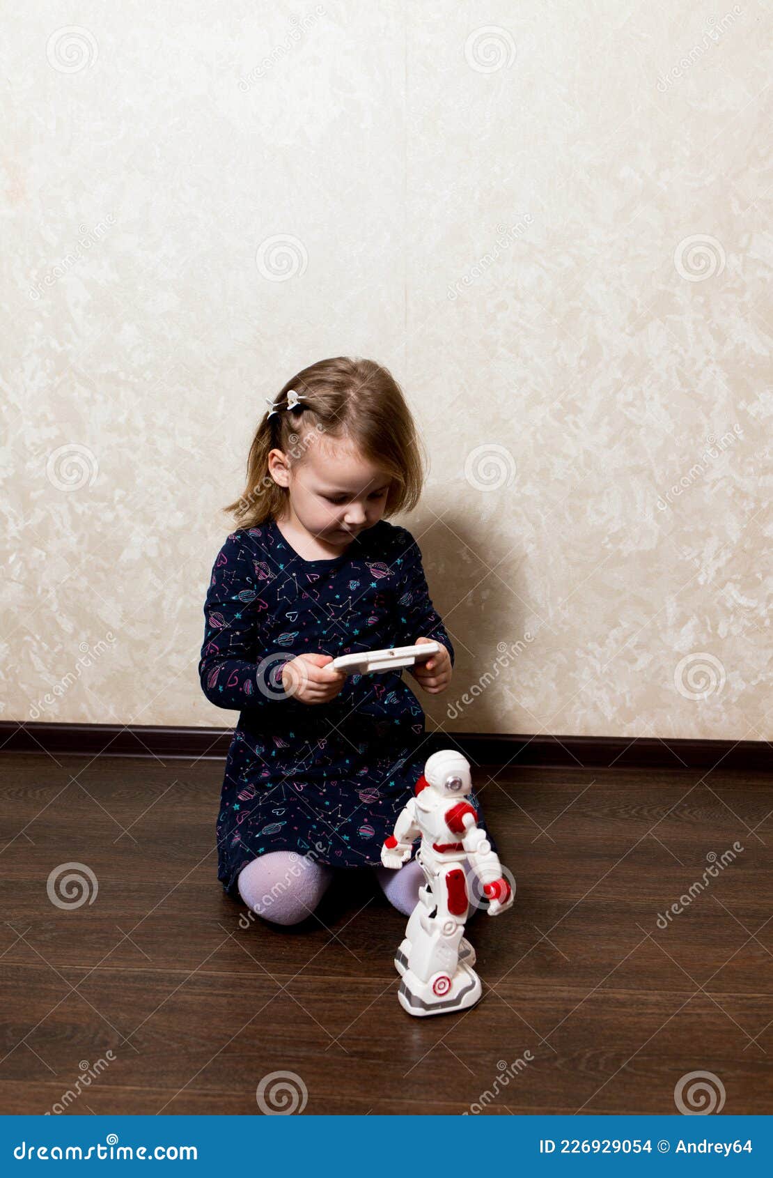 Infatuated Child Boy Playing Plastic Toy Lizard Robot With A Remote ...