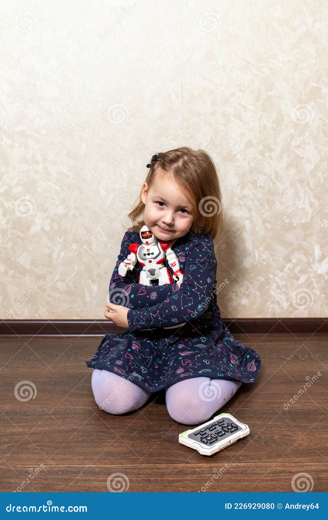 Infatuated Child Boy Playing Plastic Toy Lizard Robot With A Remote ...