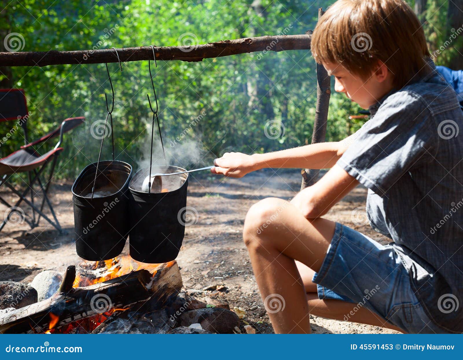 Child cooking on campfire stock image. Image of leisure - 45591453